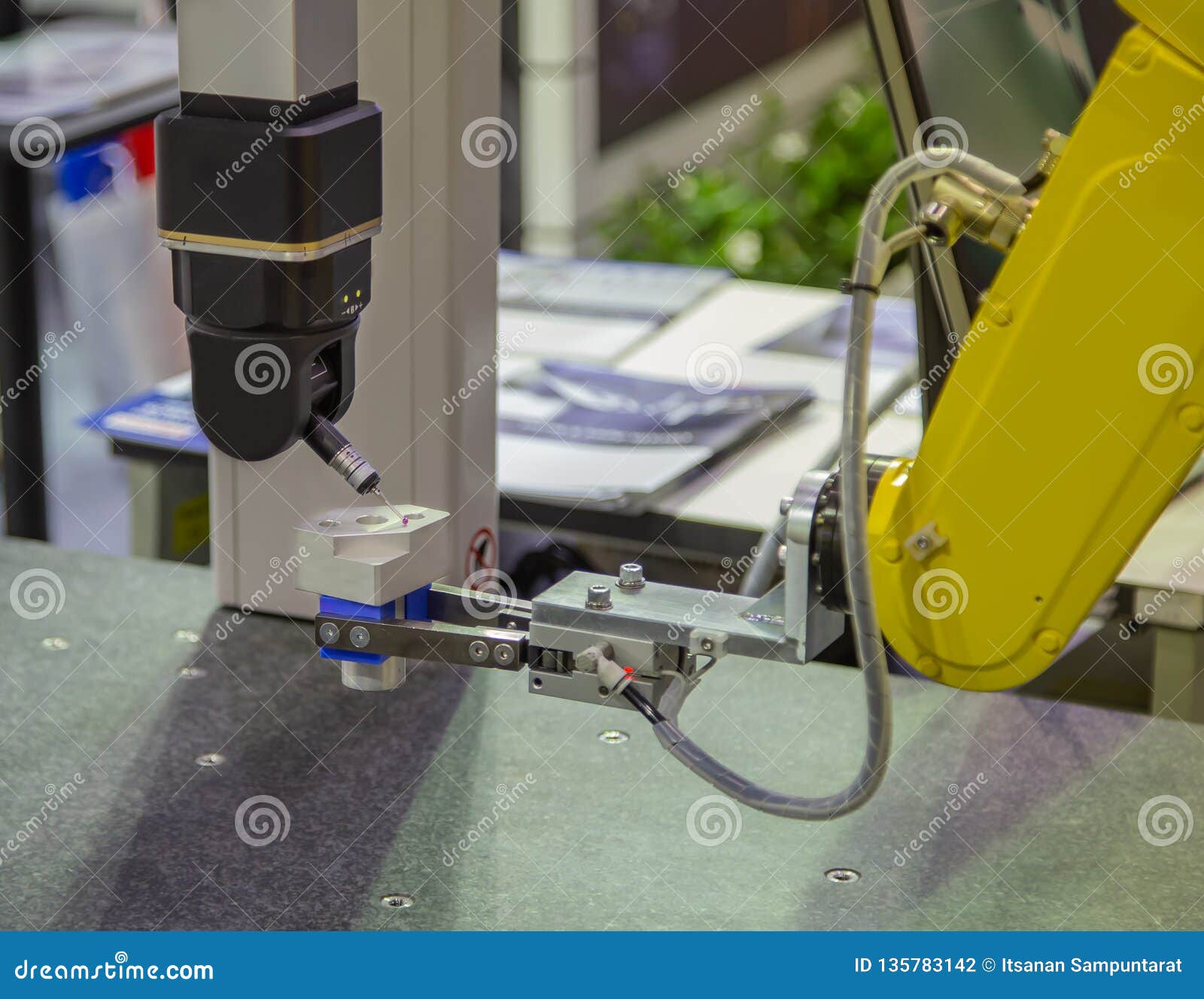 Robotic Arm Loading Workpiece To CMM Machine Stock Photo - Image of ...