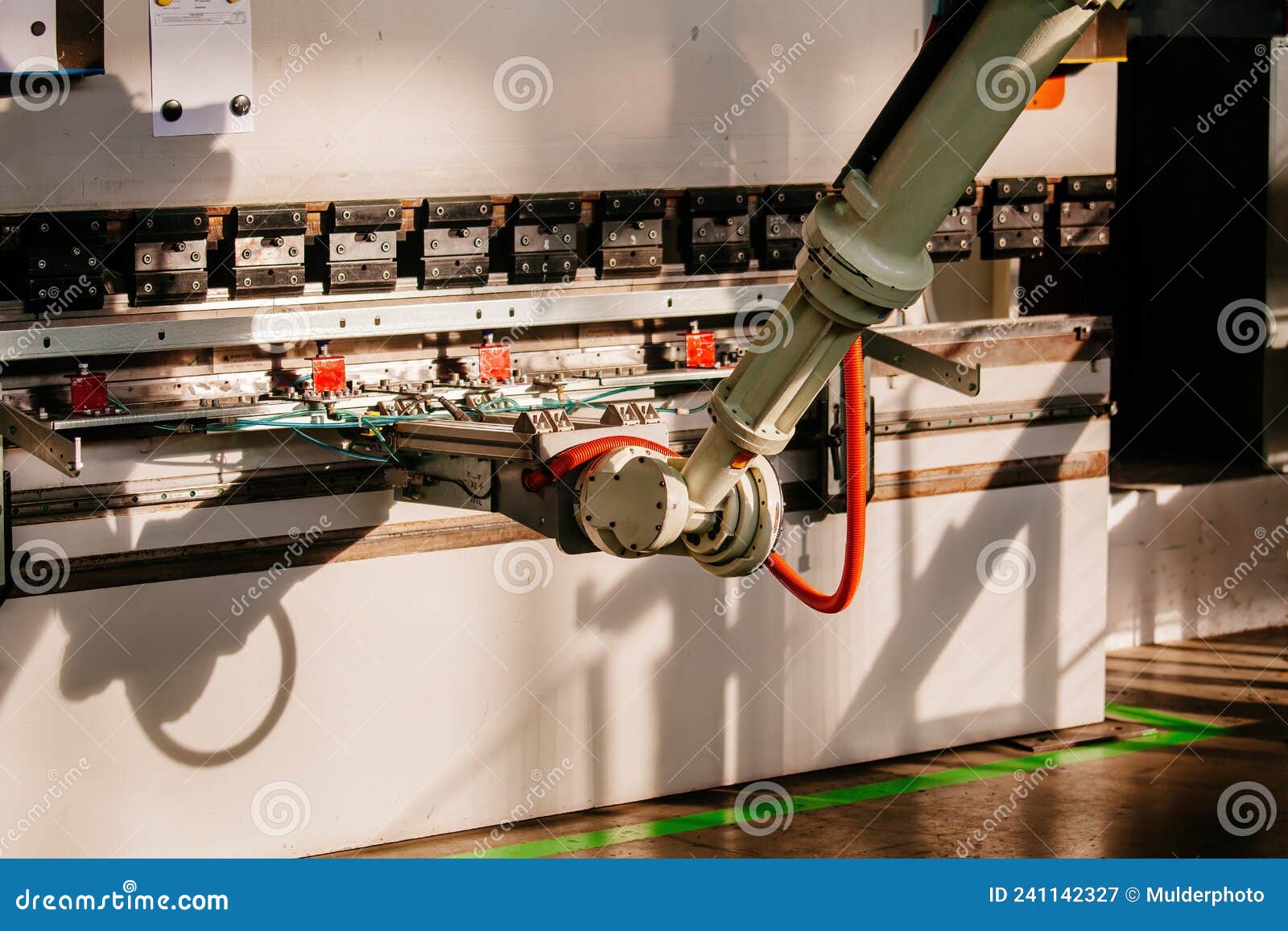 Robotic Arm Working with Metal Sheet at Hydraulic Bending Machine Stock ...