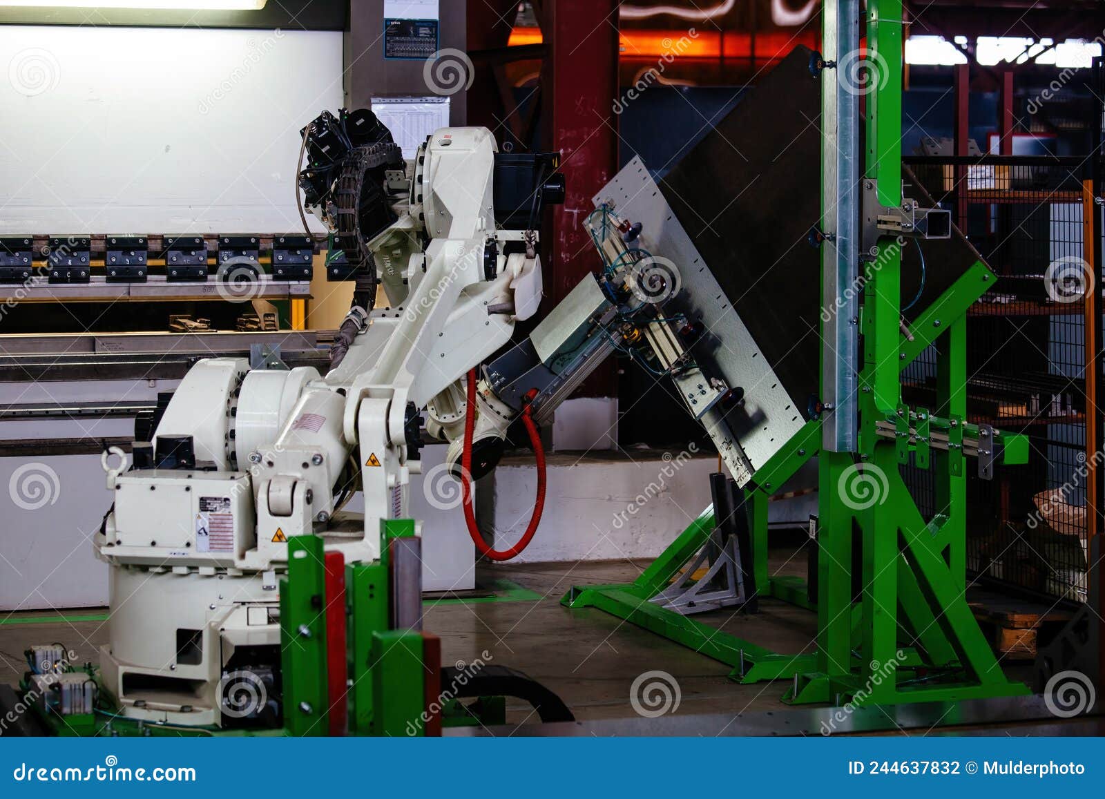 Robotic Arm Working with Metal Sheet at Hydraulic Bending Machine Stock ...