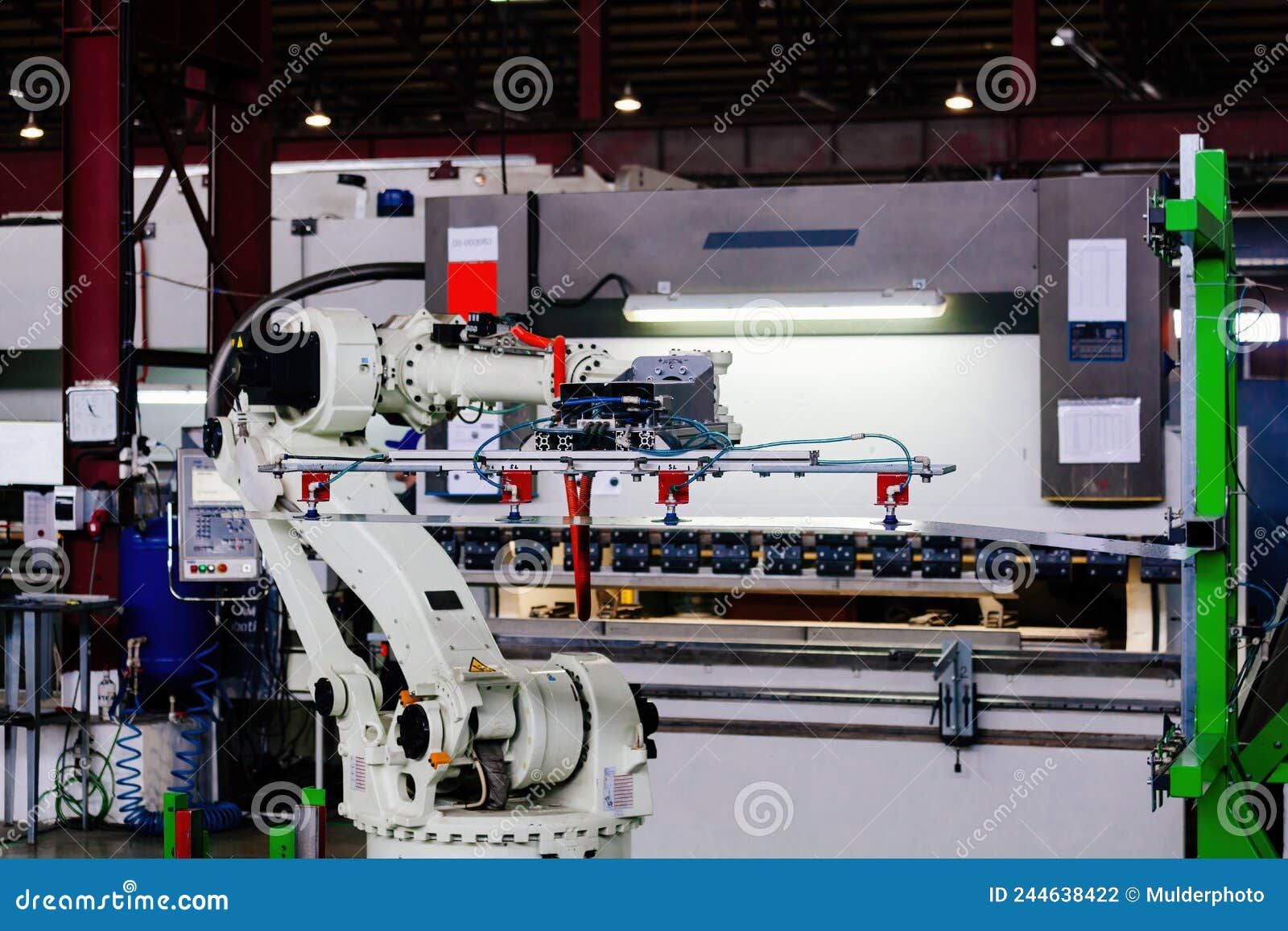 Robotic Arm Working with Metal Sheet at Hydraulic Bending Machine Stock ...
