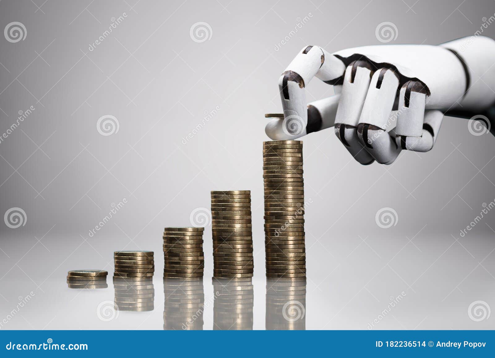 Robotic Hand Placing Coin Over the Increasing Coins Stack Stock Photo ...