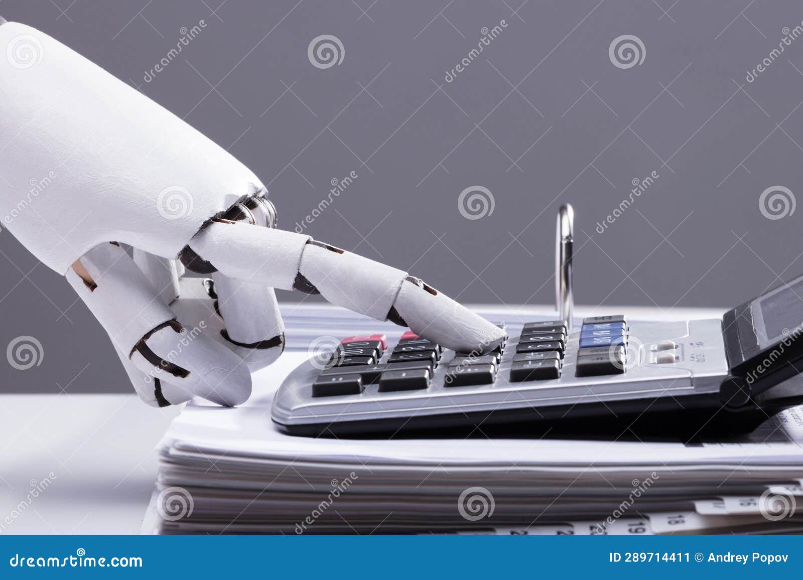 Robotic Hand Using Calculator in Office Stock Image - Image of process ...