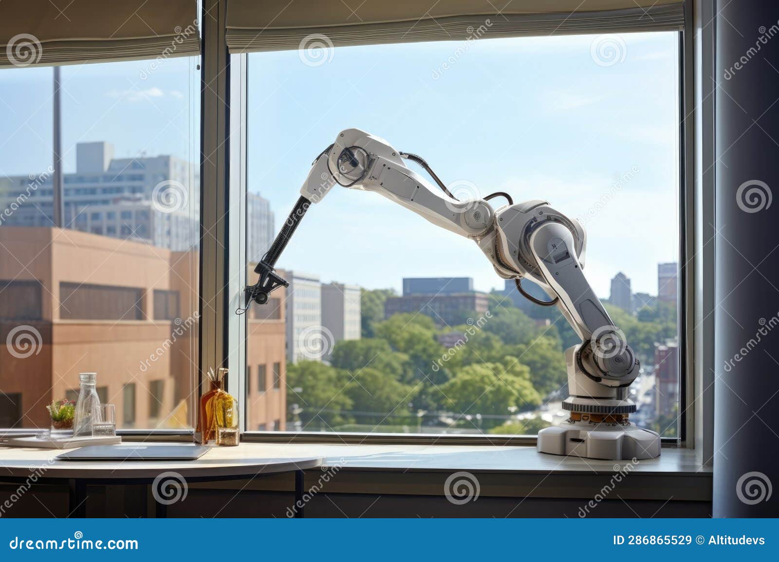 Robotic Window Cleaner with Extended Arm on Office Window Stock ...