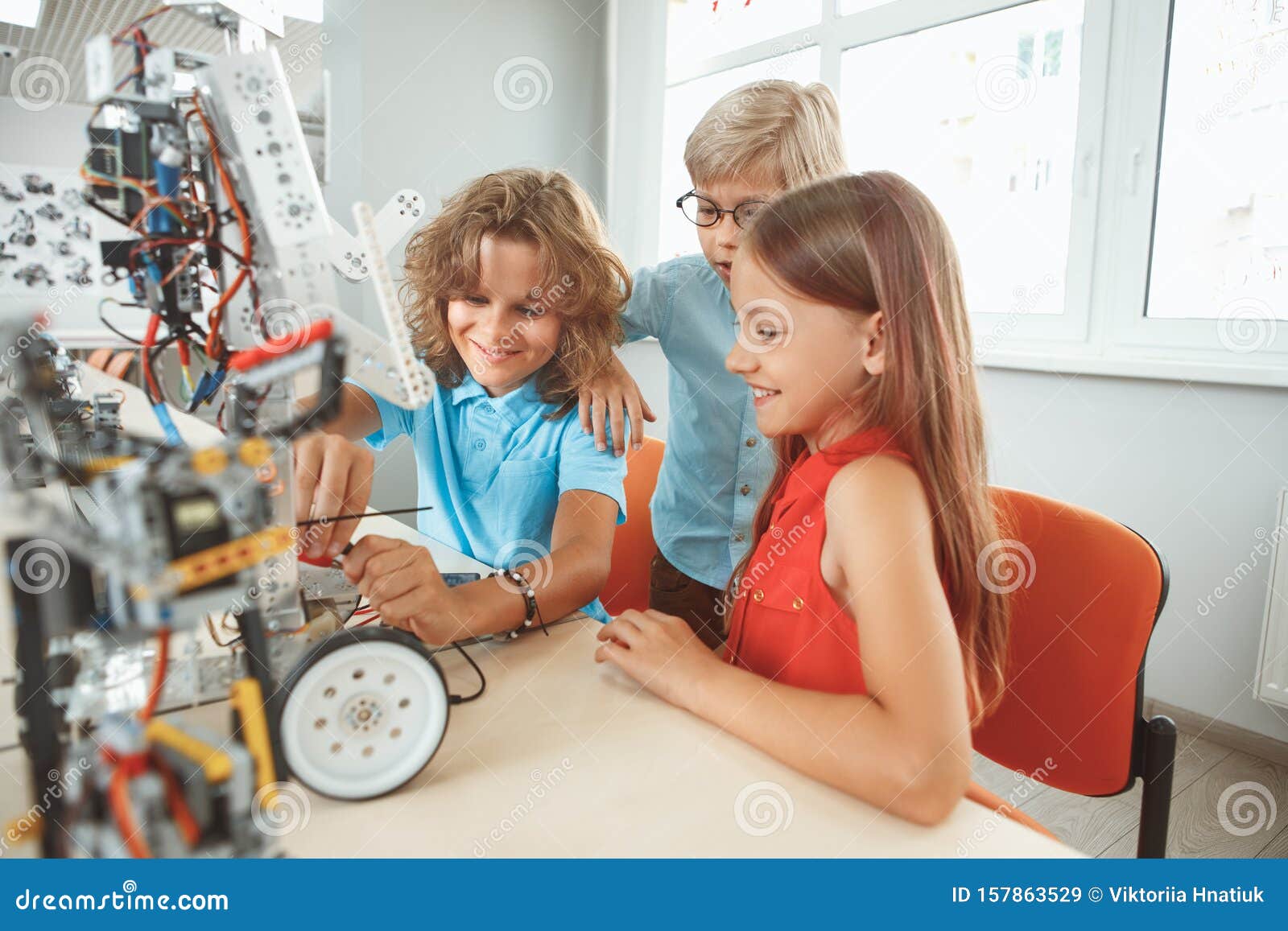 Robotics. Children Sitting Having Class Making Robots Smiling Excited ...
