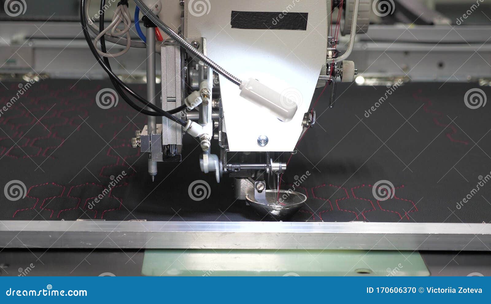 Robotics with Cnc Works in Sewing a Production Line. Robot Sewing ...