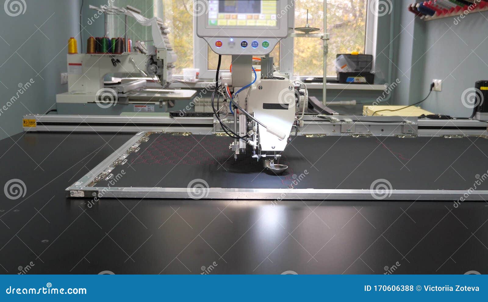 Robotics with Cnc Works in Sewing Production Line. Robot Sewing Machine ...