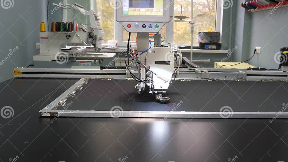 Robotics with Cnc Works in Sewing Production Line. Robot Sewing Machine ...