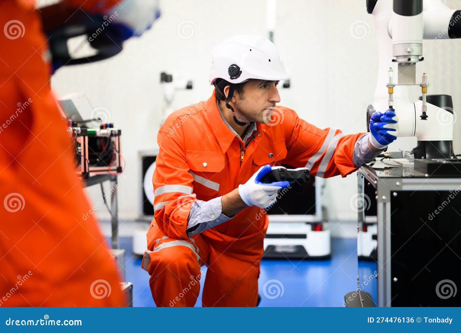Robotics Controller Engineers Working and Solving Problems on Machine Stock Photo - Image of ...