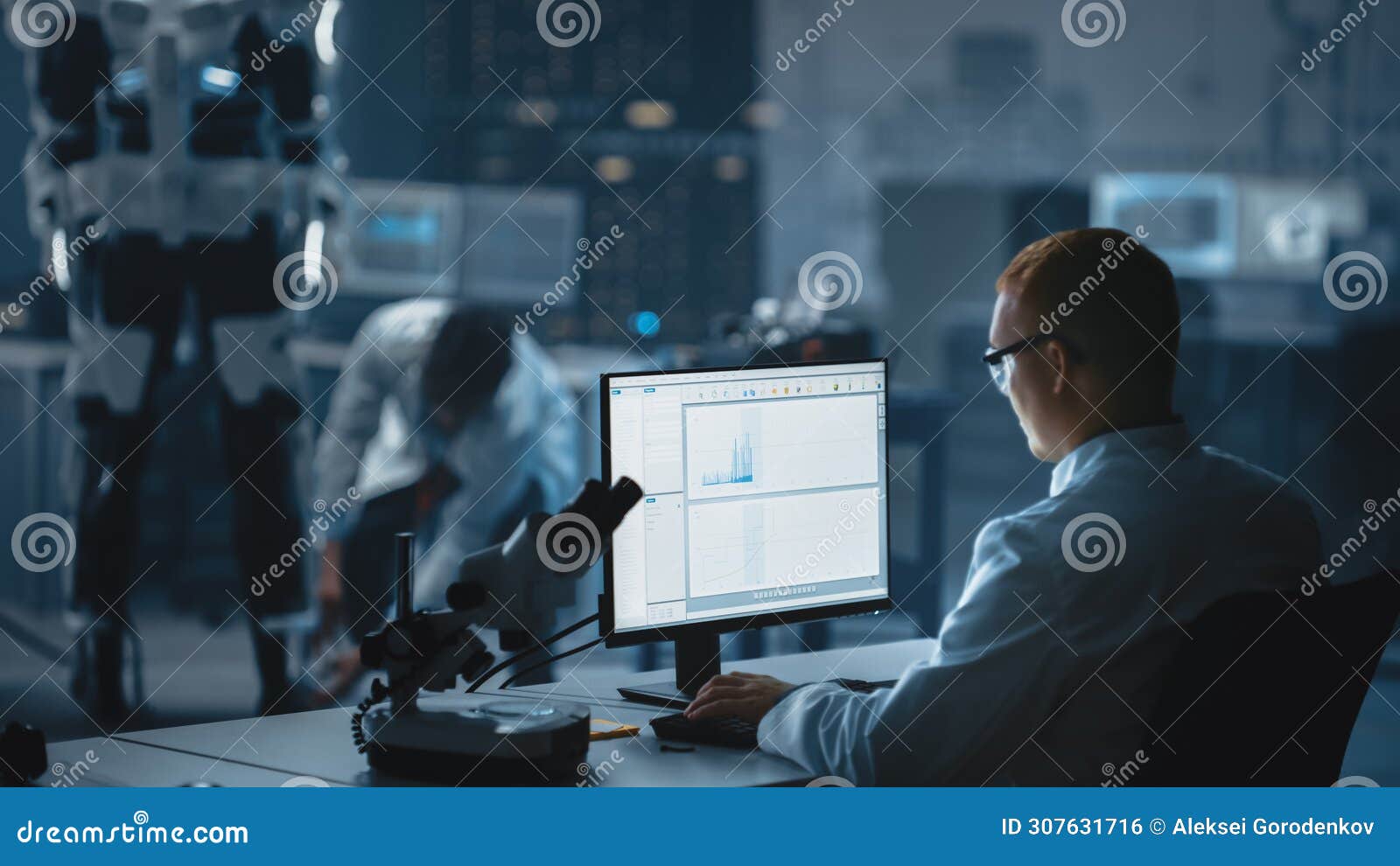 In Robotics Development Laboratory: Chief Analyst Uses Computer, Top ...