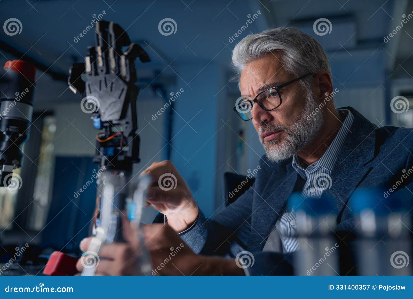 Robotics Engineer Adjusting, Calibring Robotic Prosthetic Hand. Concept ...