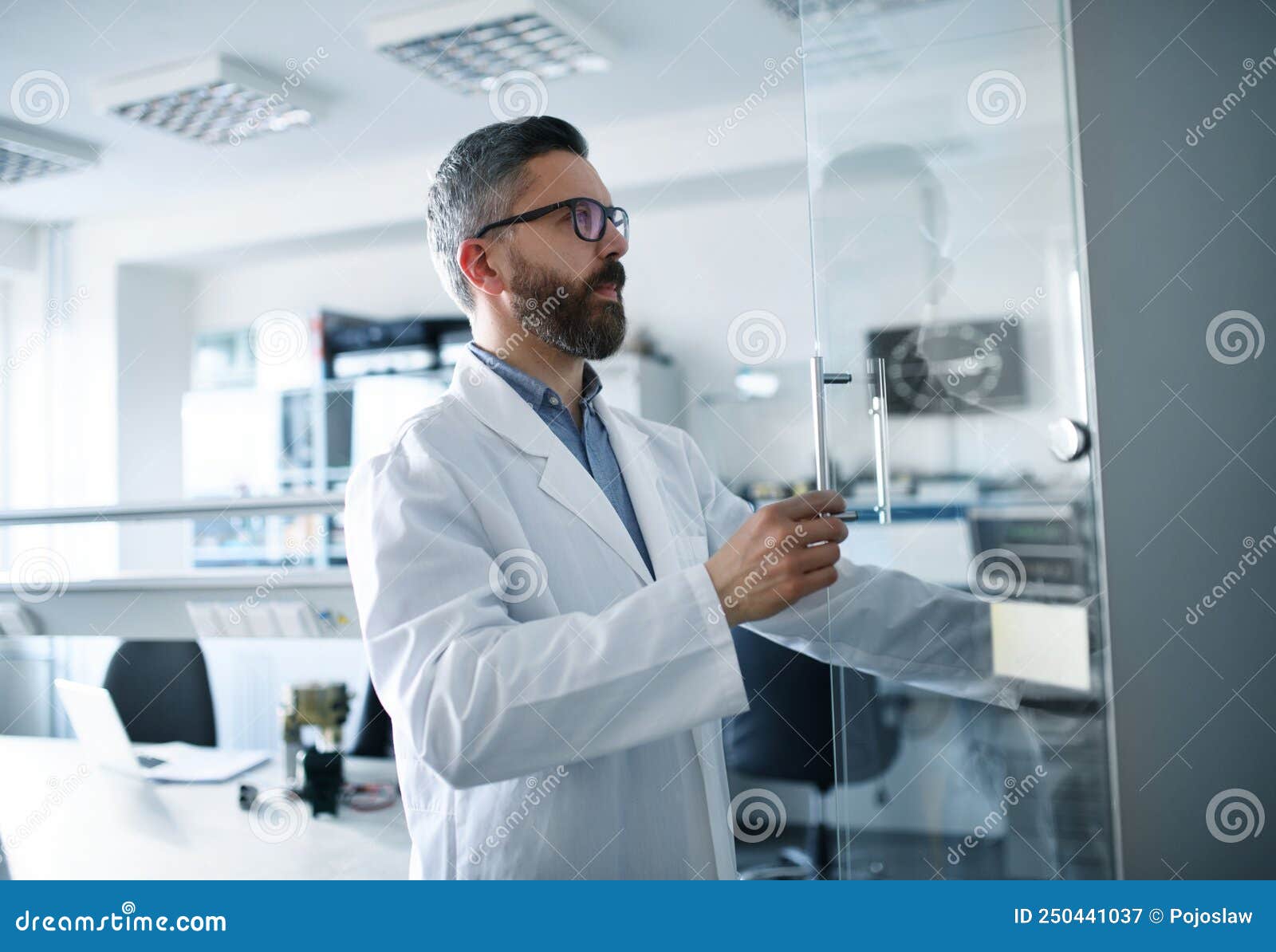 Robotics Engineer Working on Desing of Modern Robotic Arm in Laboratory ...