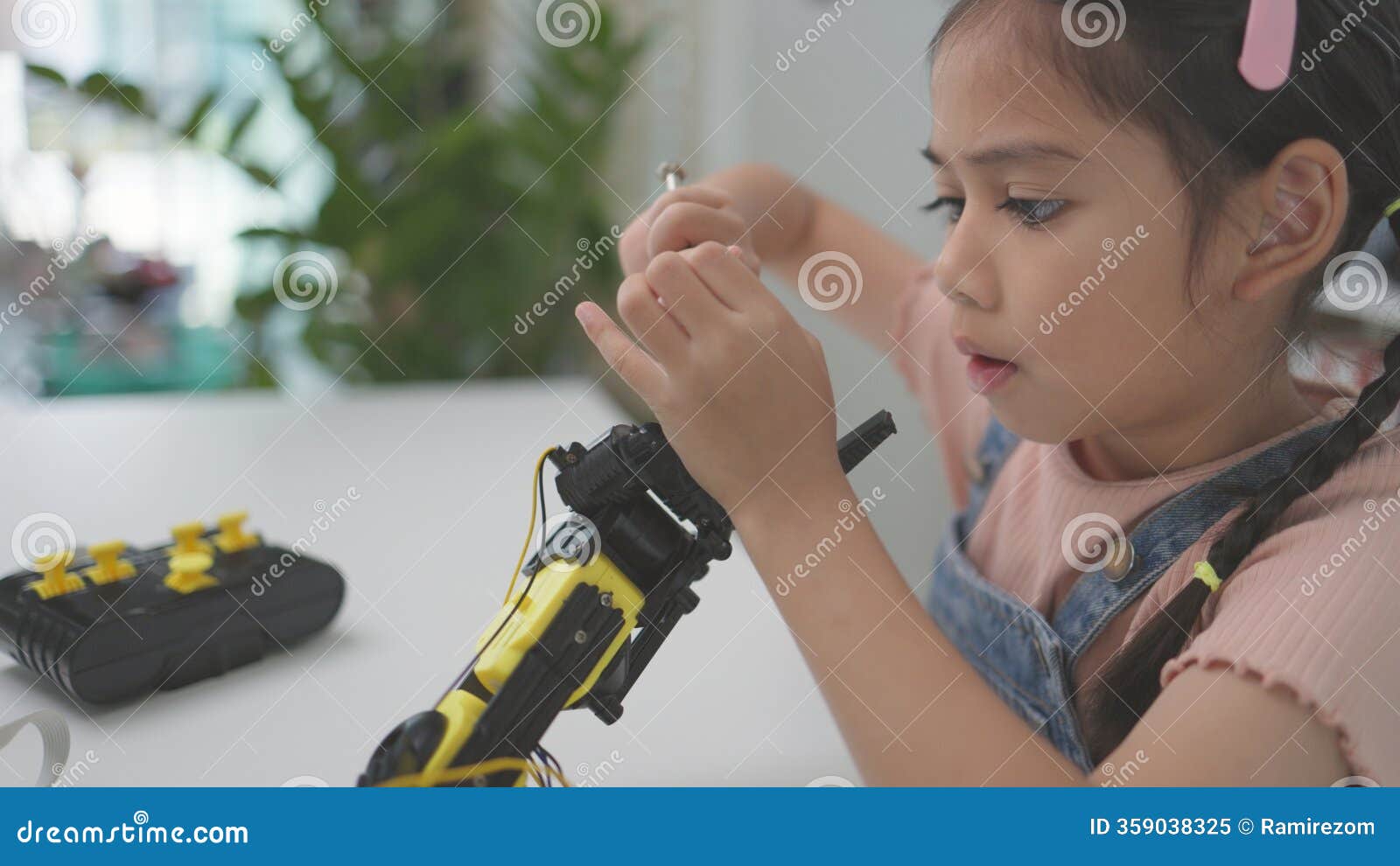 Robotics Programming Class. Children Construct and Code Robots Stock ...