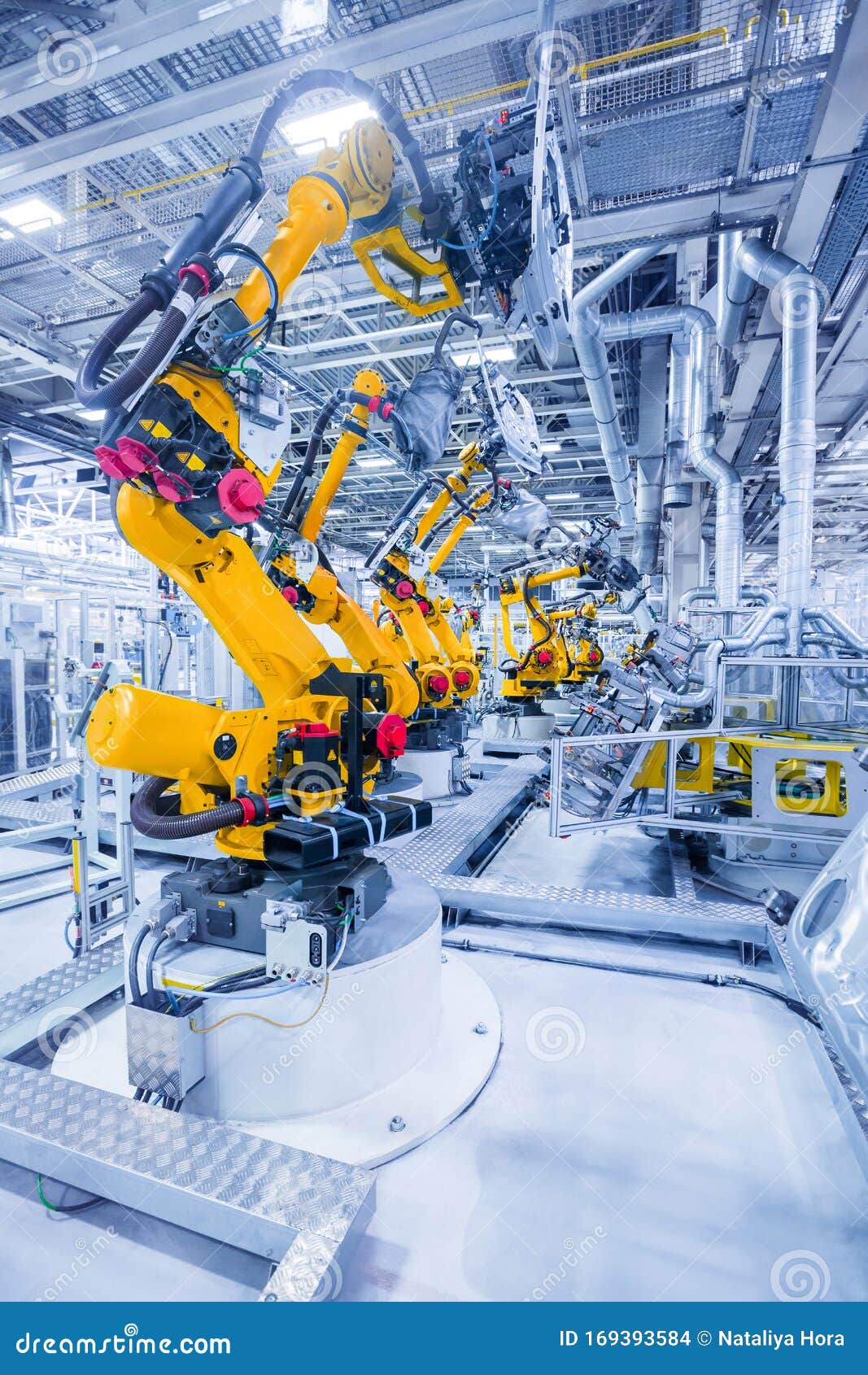 Robots in a car plant stock photo. Image of metal, factory - 169393584