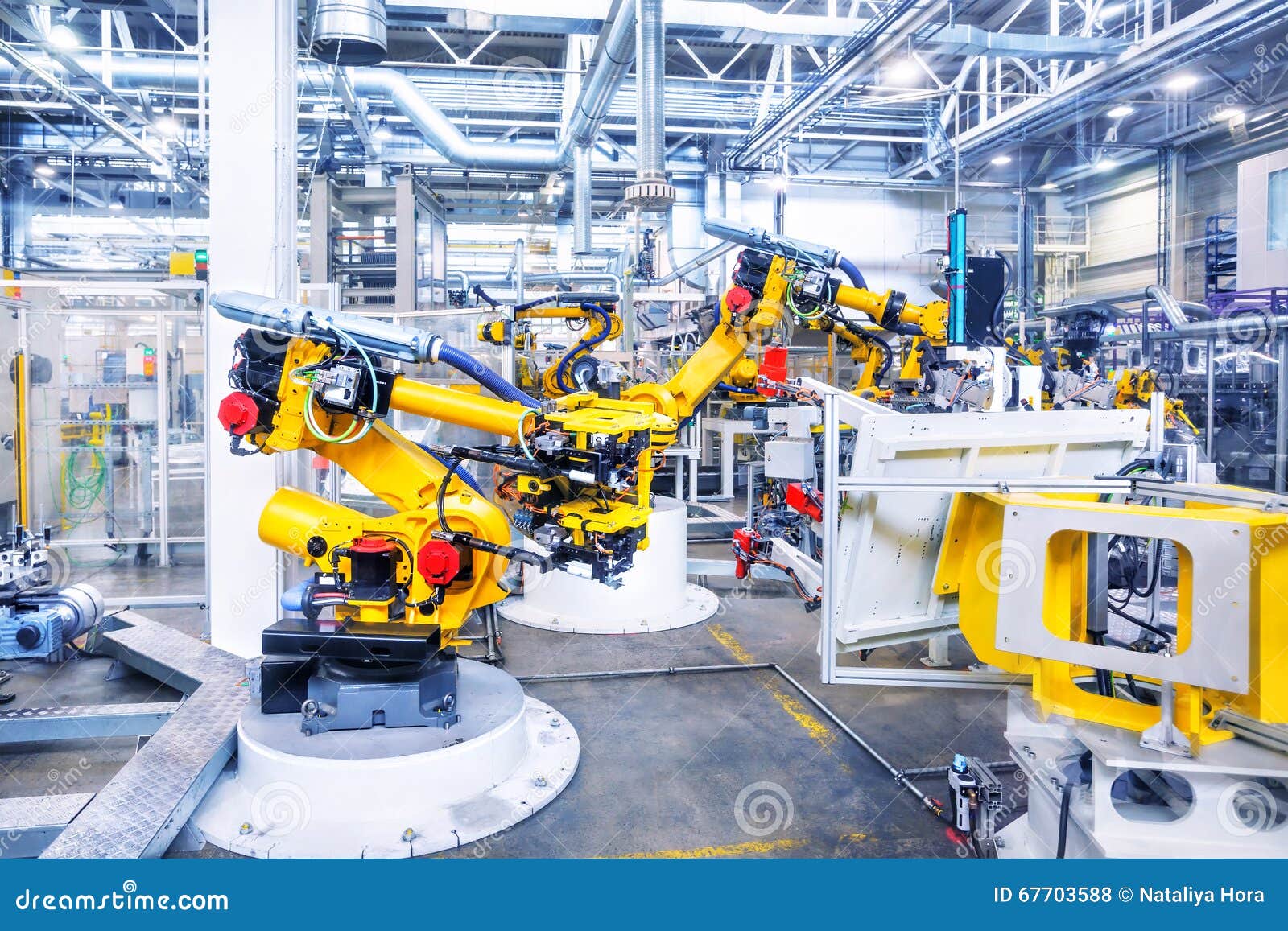Robots in a car plant stock photo. Image of automotive - 67703588