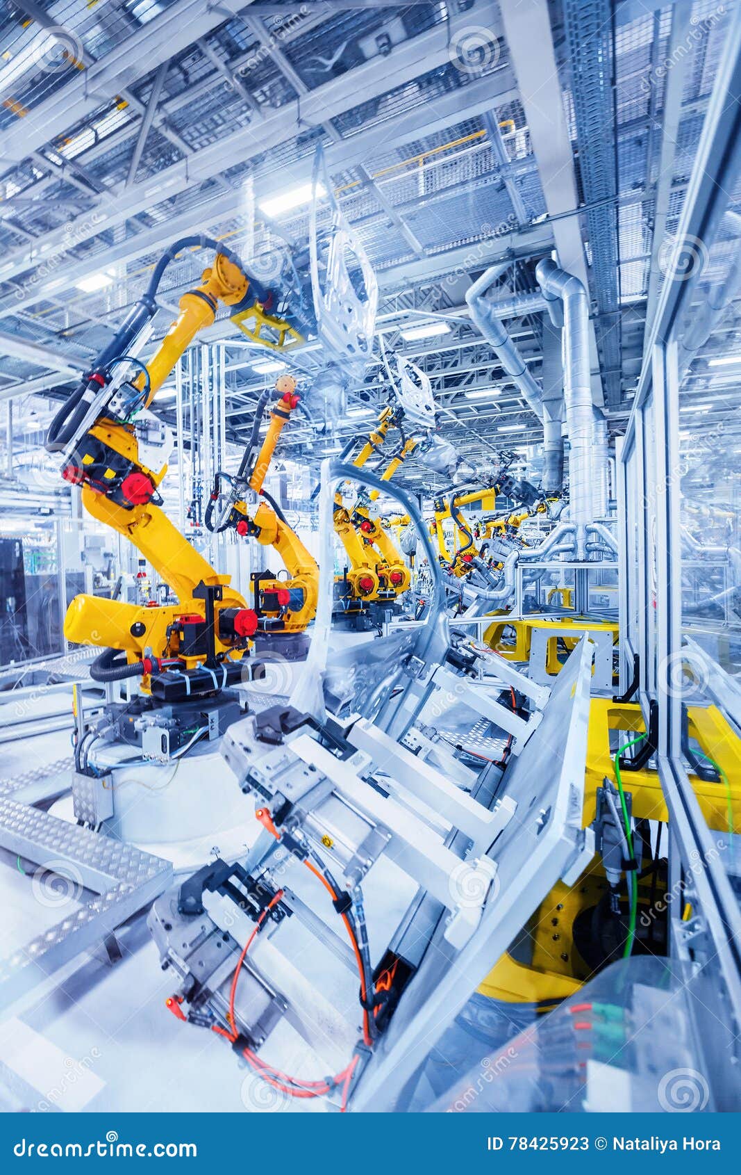 Robots in a car plant stock image. Image of construction - 78425923