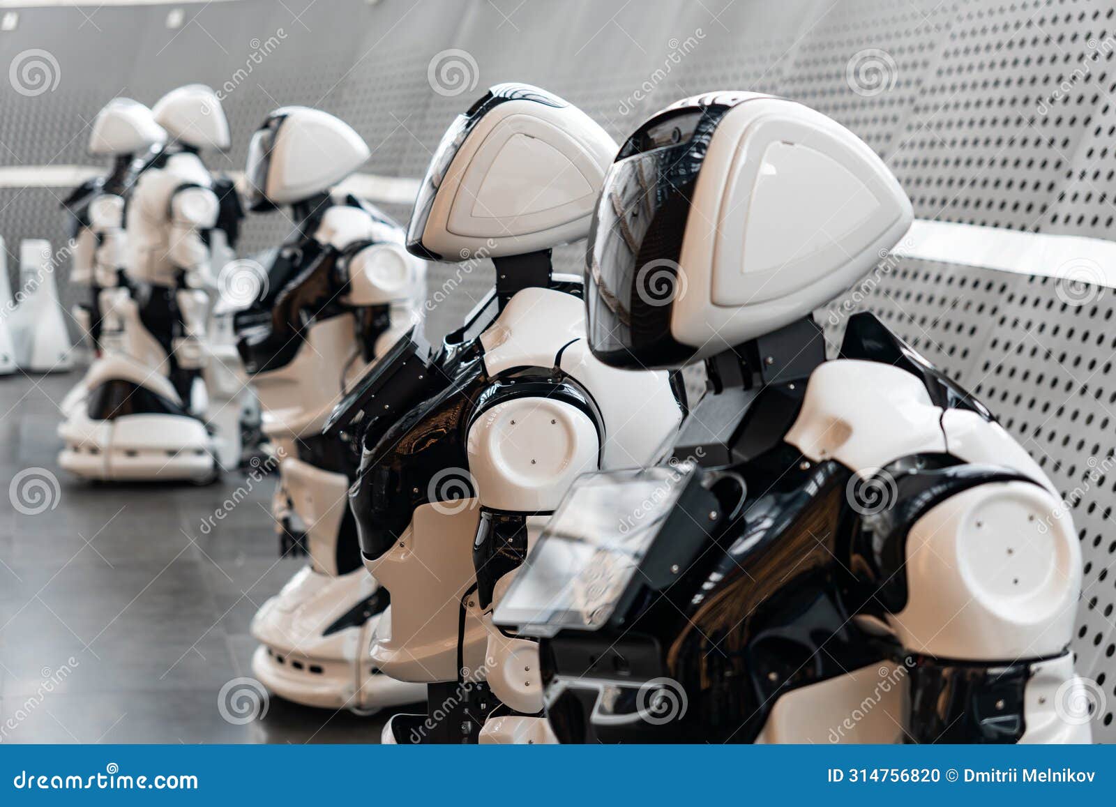 Robots are Charged from the Power Grid.. Concept of Production of ...