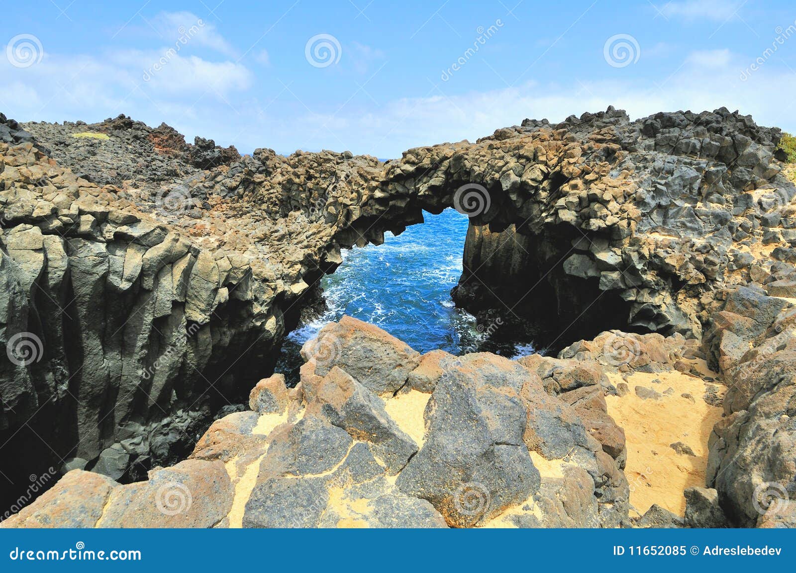 Rock arc stock image. Image of spain, island, sand, mountain - 11652085
