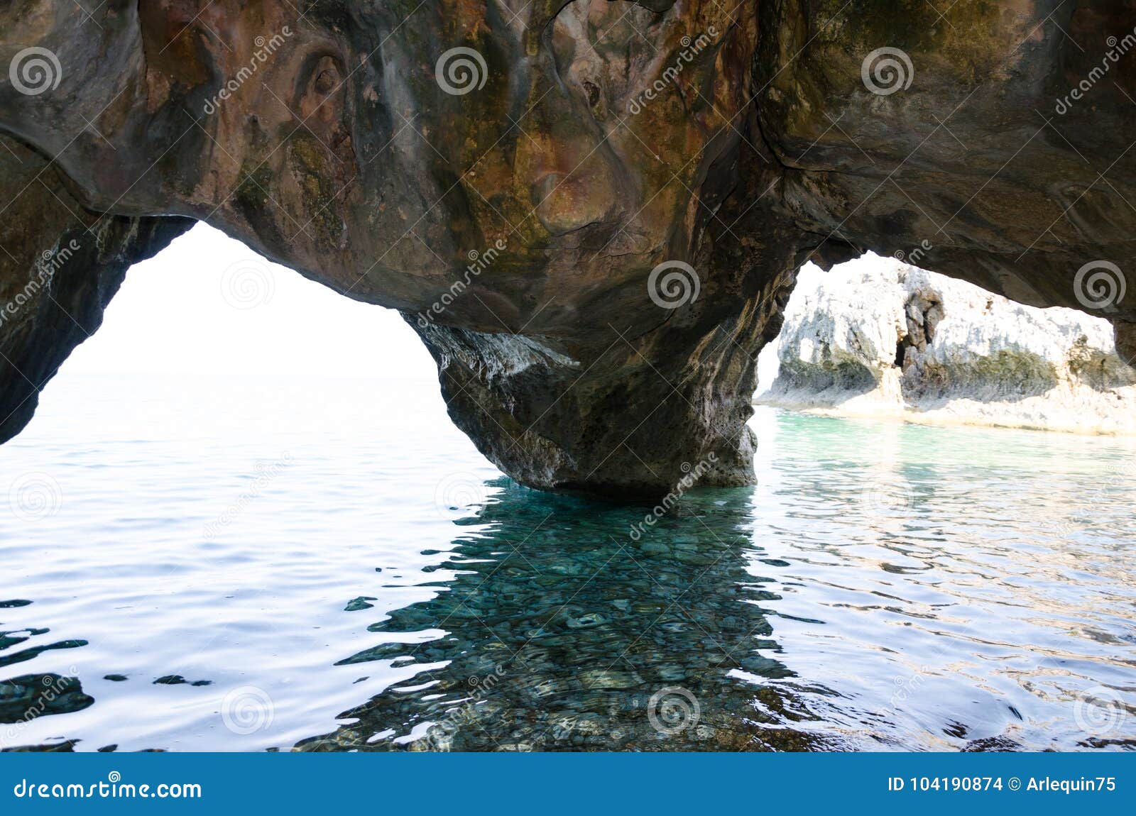 Rock arc2 stock photo. Image of transparent, cliff, clear - 104190874