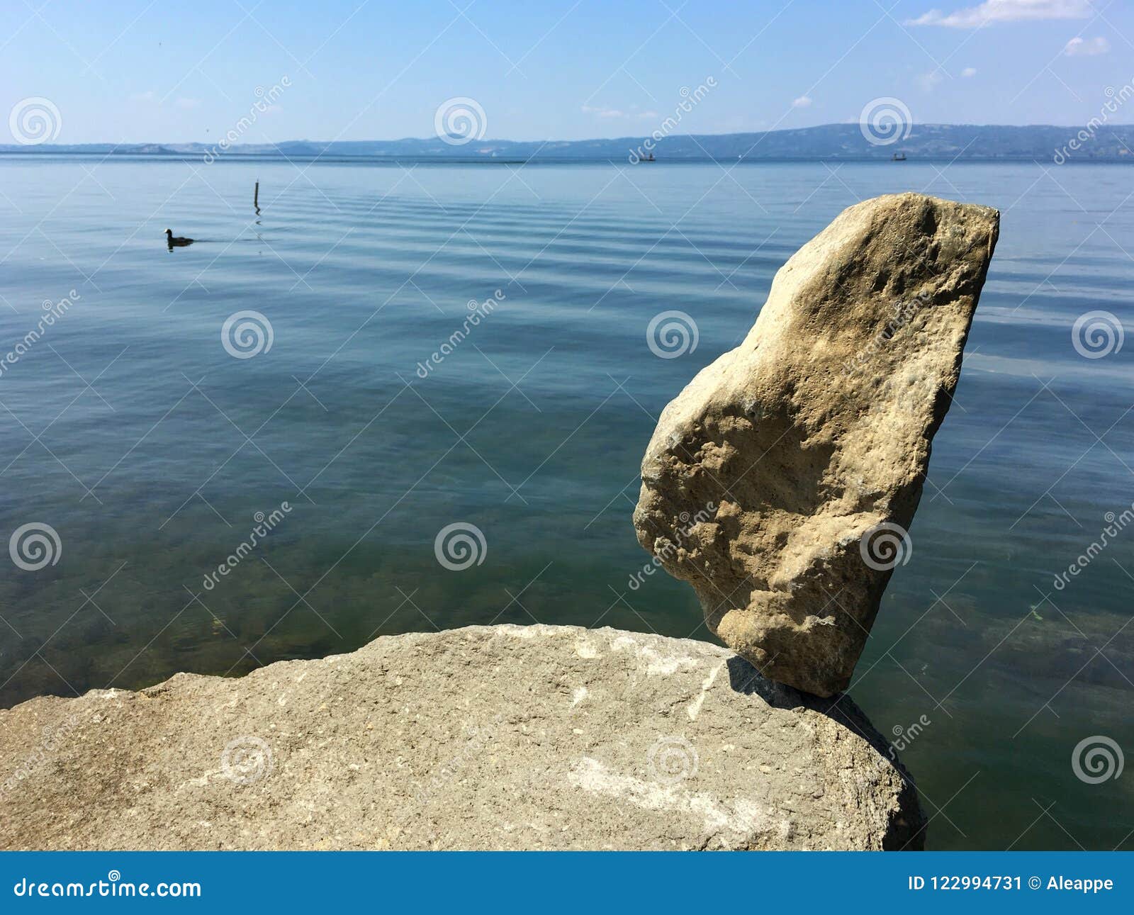 Gravity stock image. Image of shore, placid, rock, balanced - 122994731