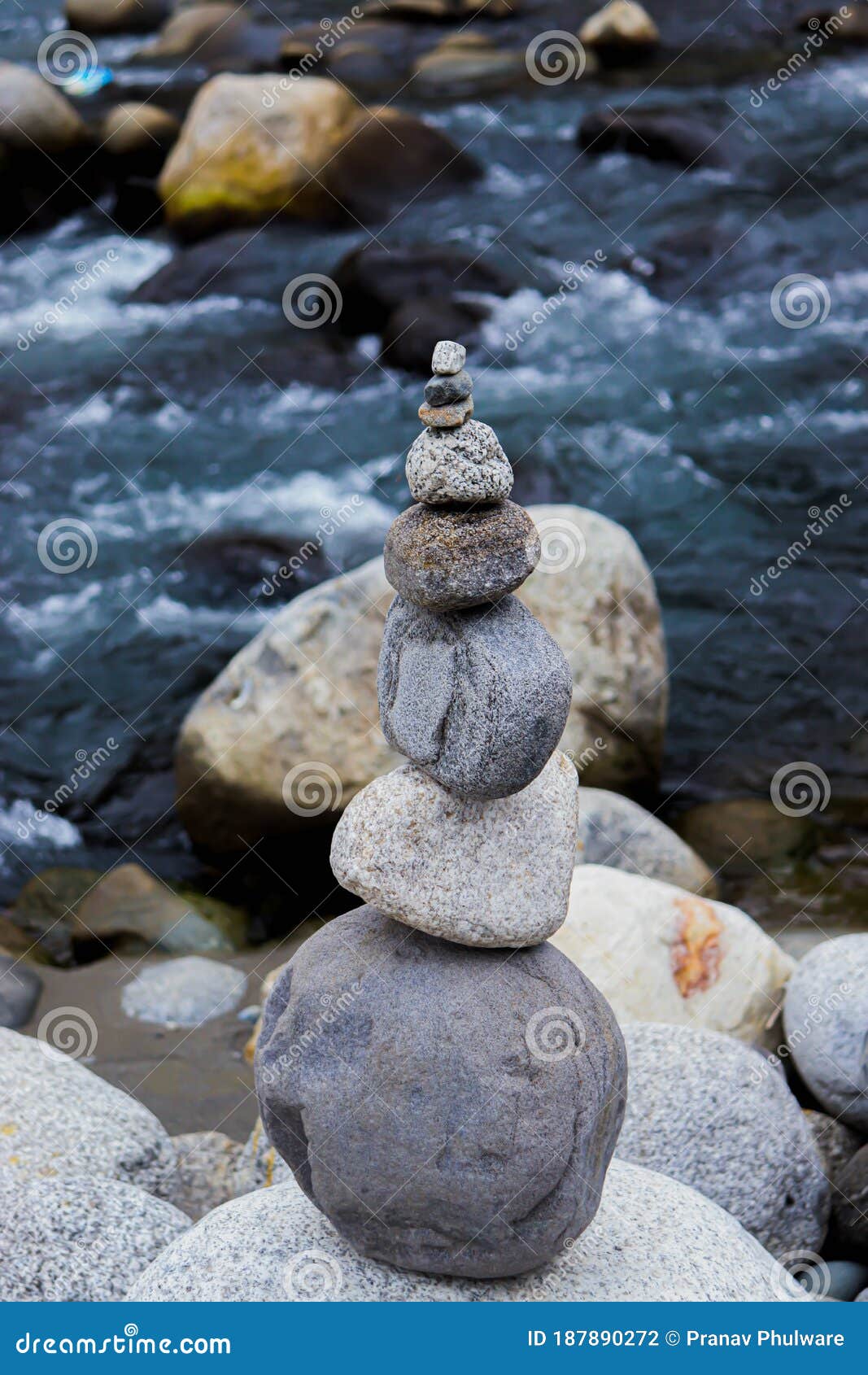 Rock Balancing Having Flowing River in the Background Stock Photo ...