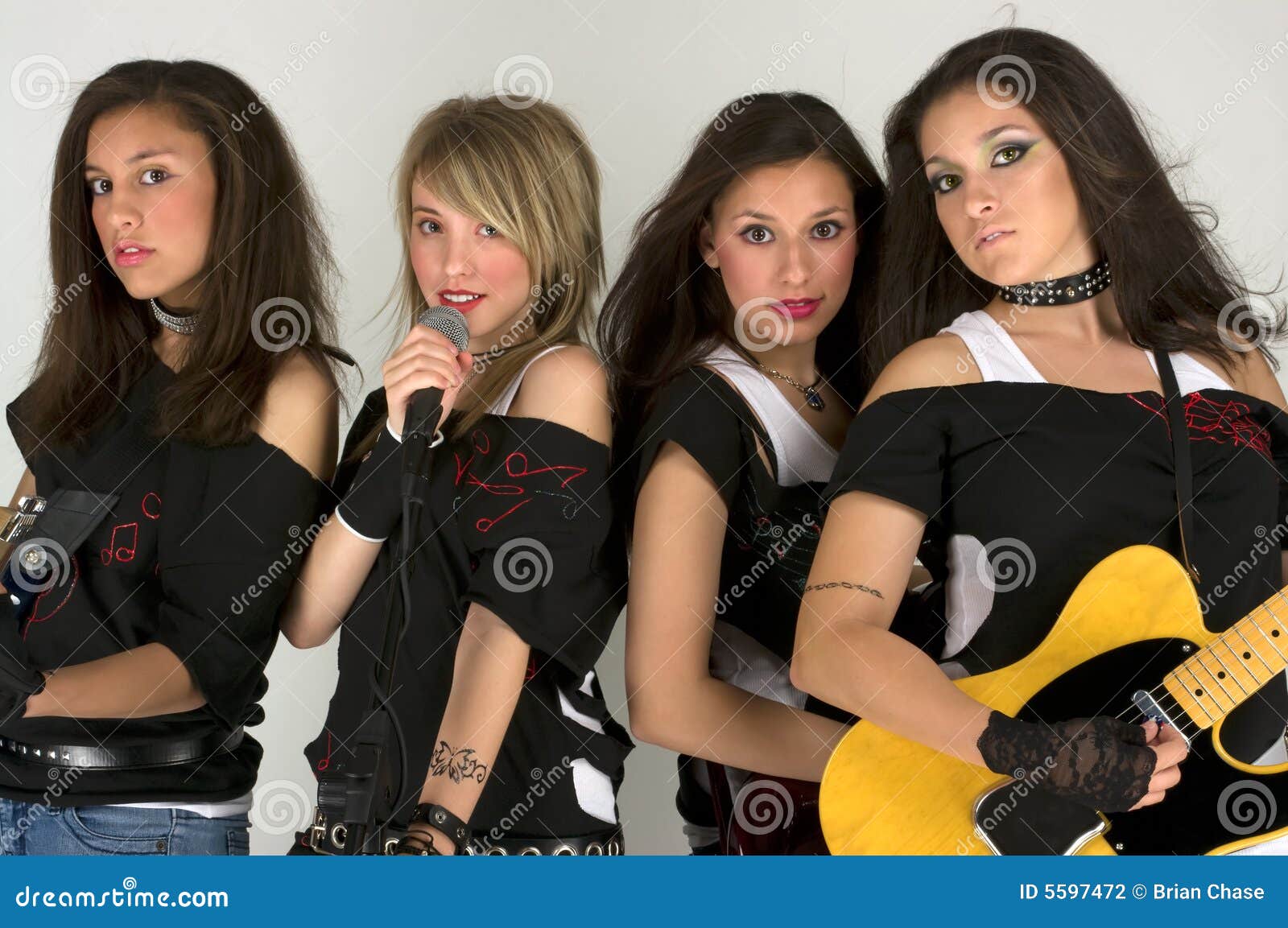Rock Band stock photo. Image of hand, earring, hairstyle - 5597472
