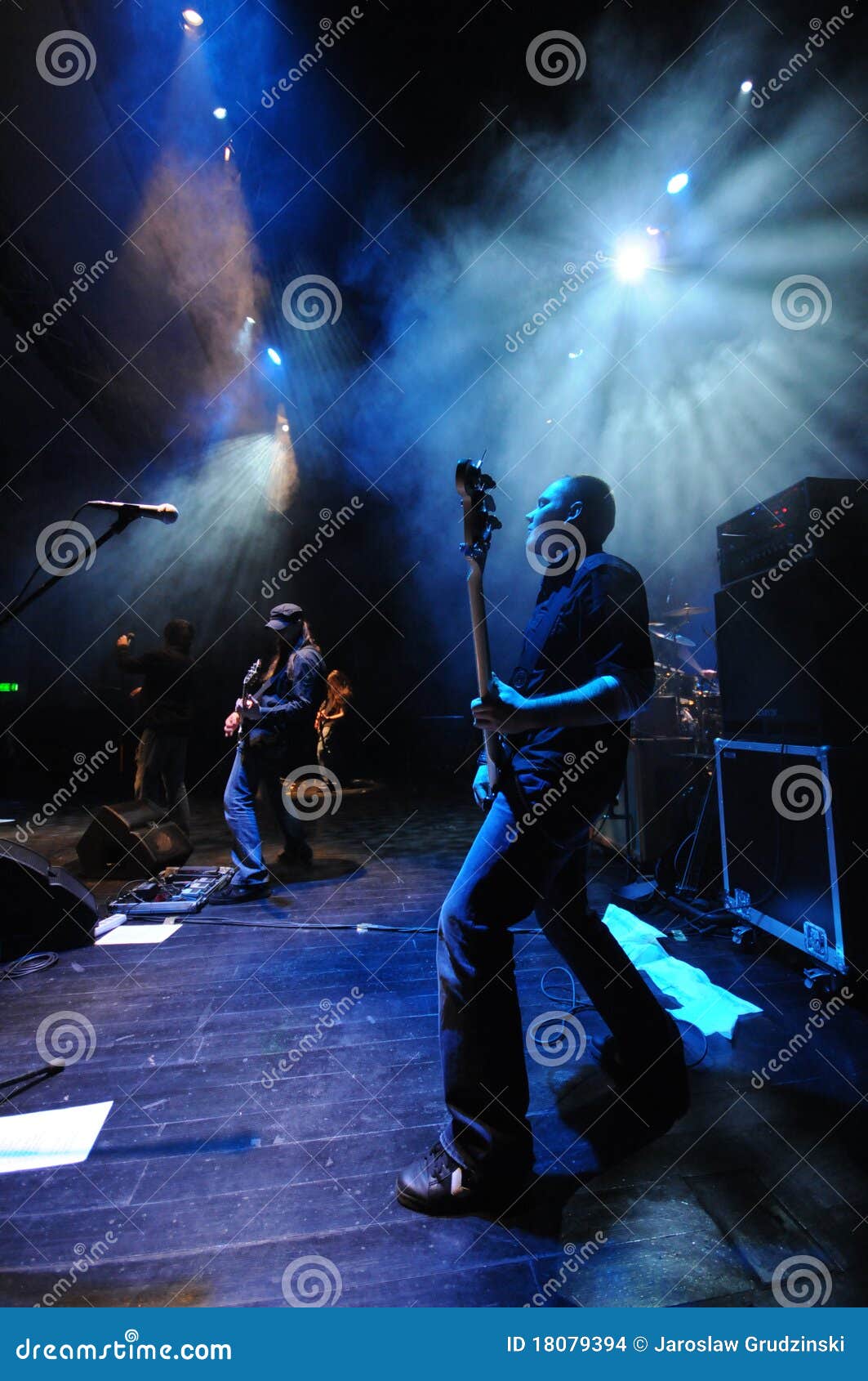 Rock band on stage editorial stock image. Image of roll - 18079394