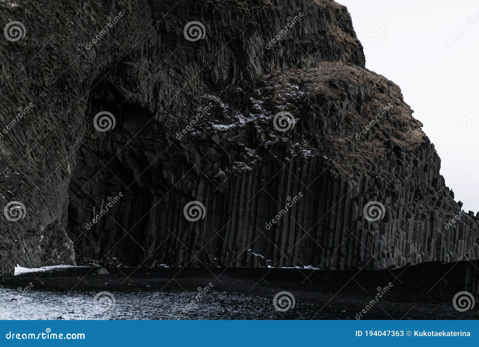 Rock of Basalt Pillars on a Black Beach in Iceland Stock Image - Image ...