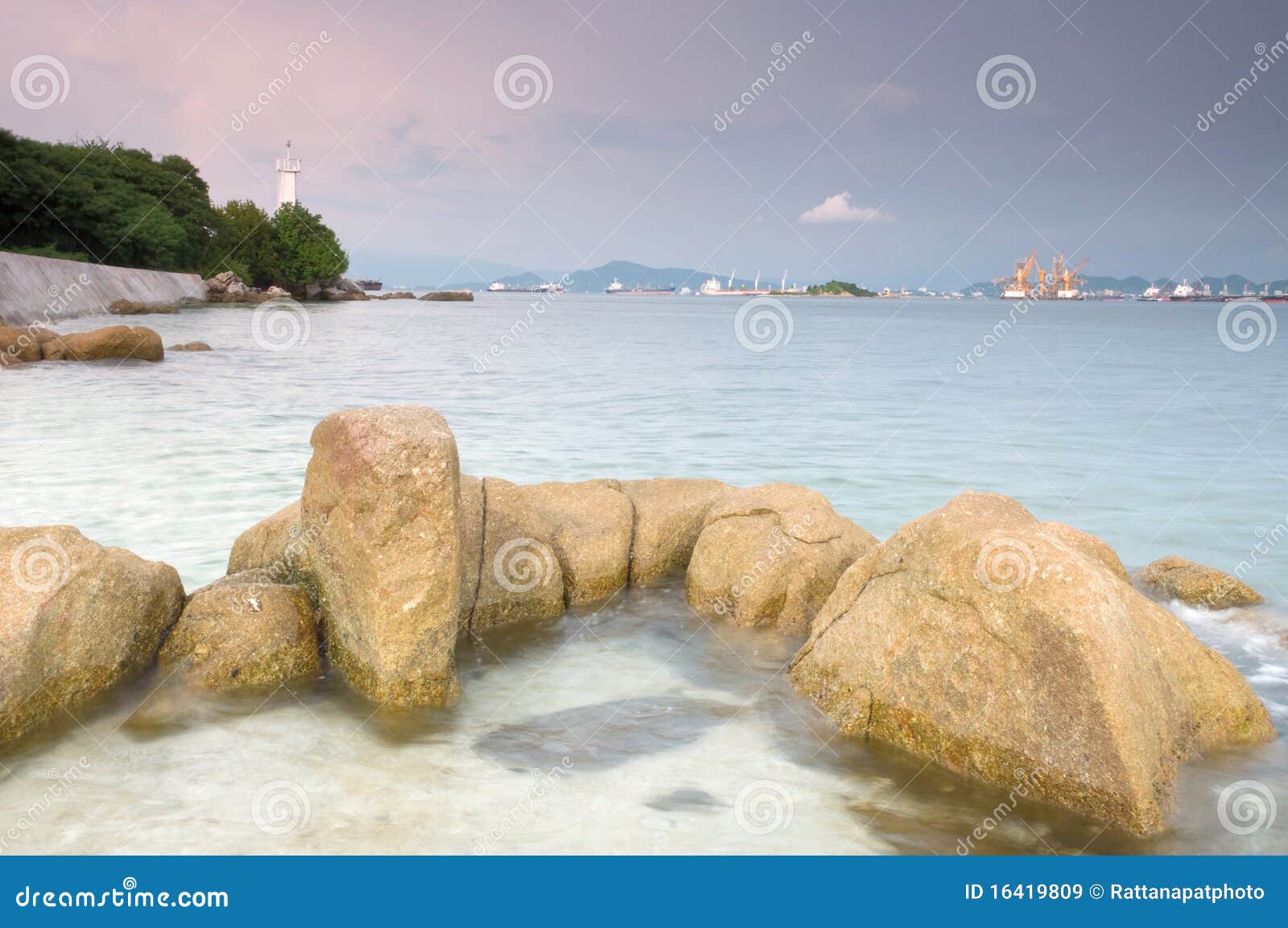 Rock on the beach stock image. Image of view, water, peaceful - 16419809