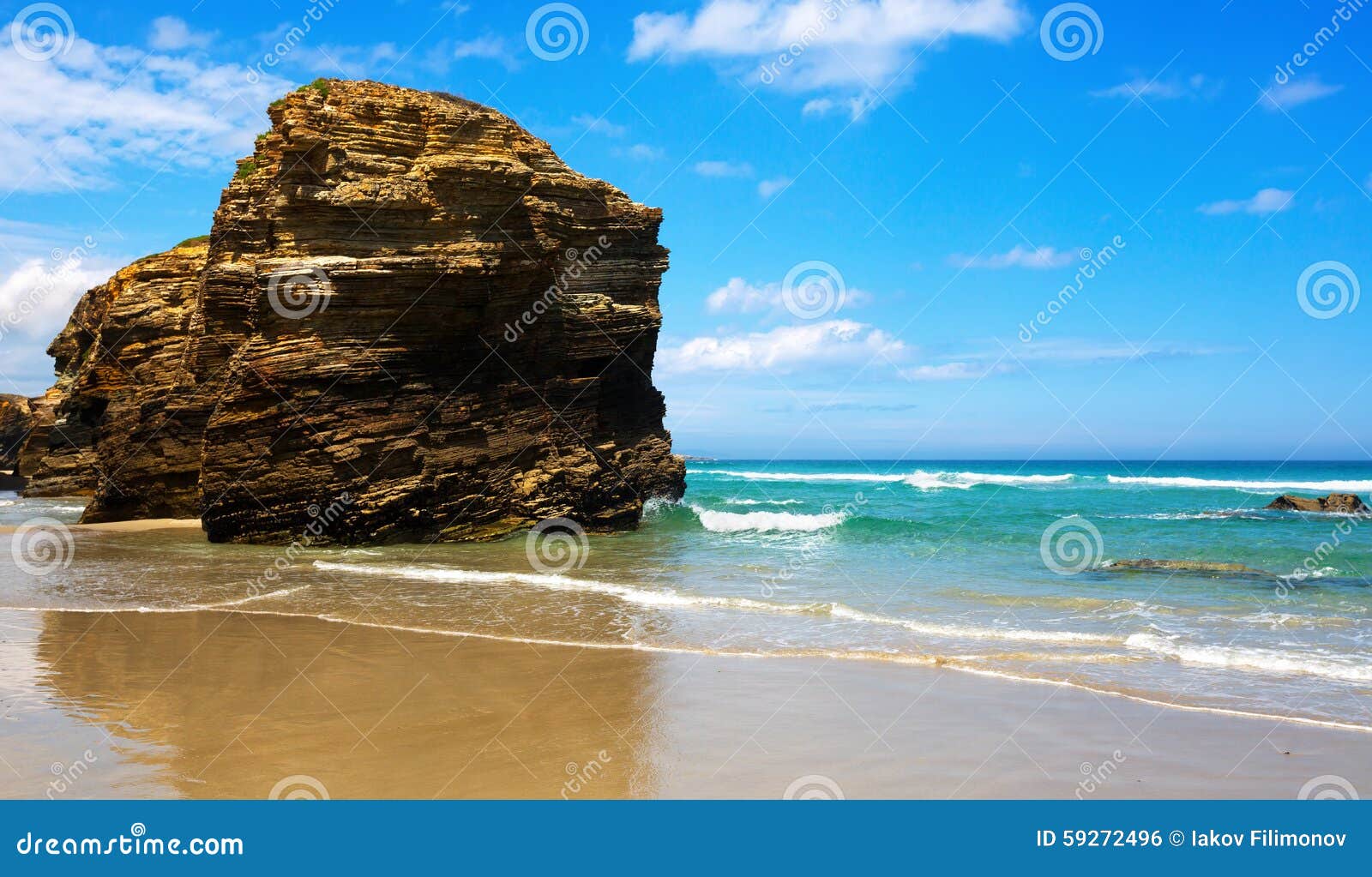 Rock at beach in summer stock photo. Image of ribadeo - 59272496
