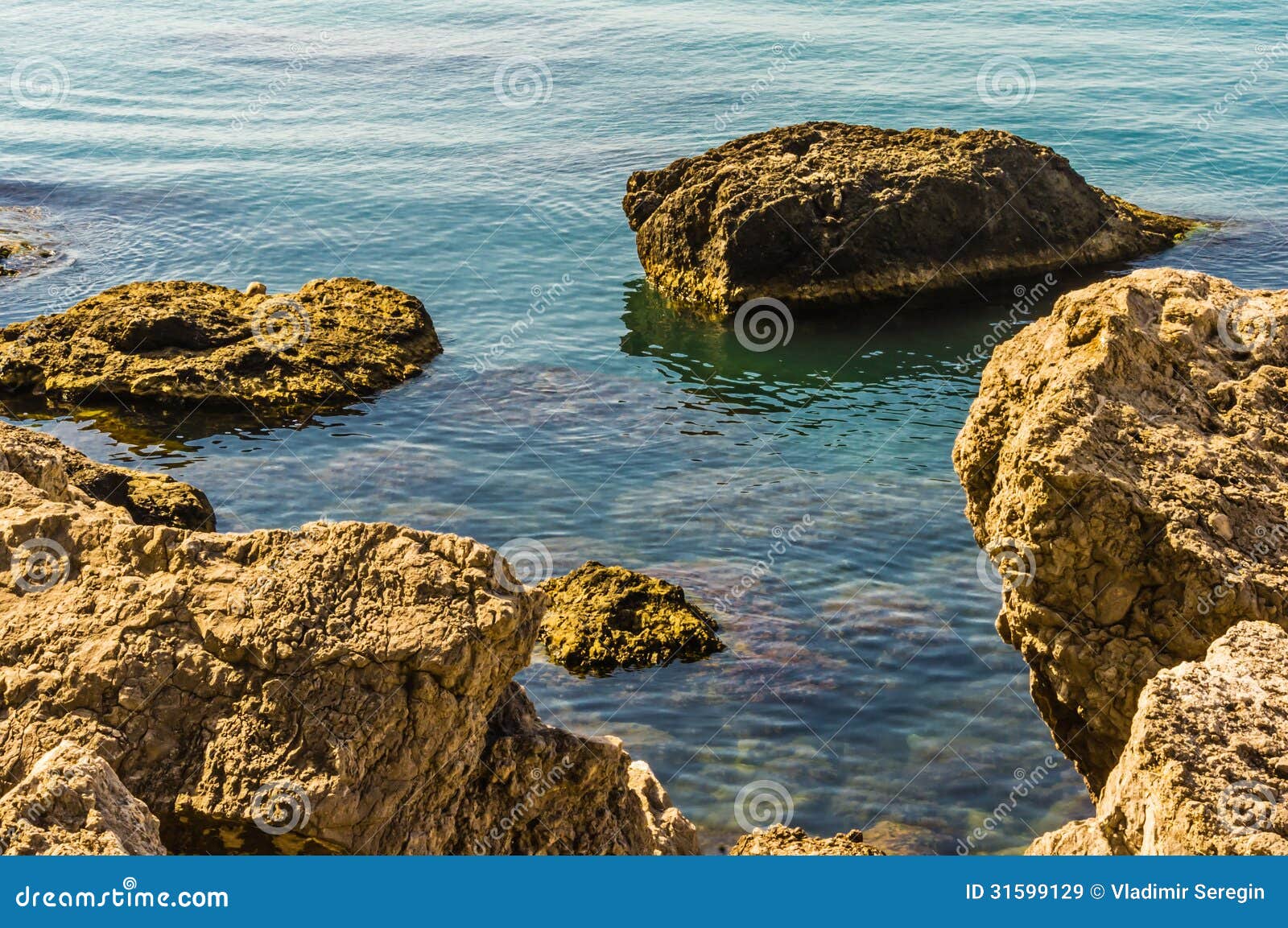 Rock in the blue sea stock image. Image of blue, coastline - 31599129