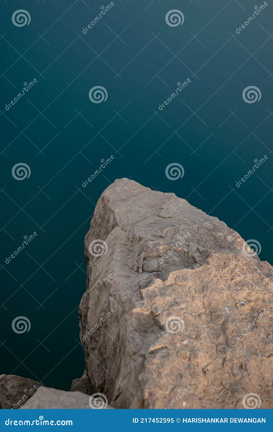 Rock with blue water stock image. Image of monument - 217452595