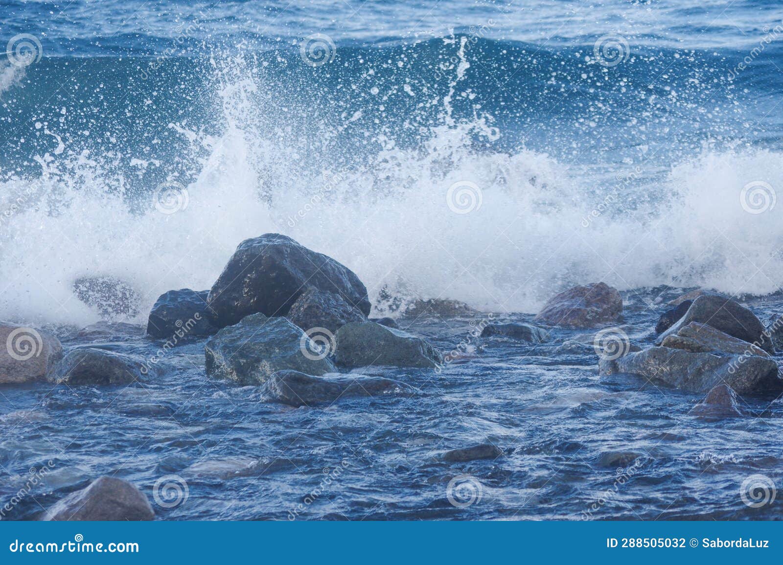 Rock breaking waves stock photo. Image of nature, breaking - 288505032