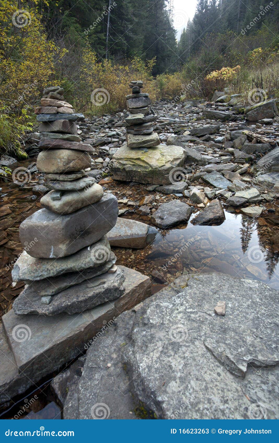 Rock cairns in the stream. stock image. Image of play - 16623263