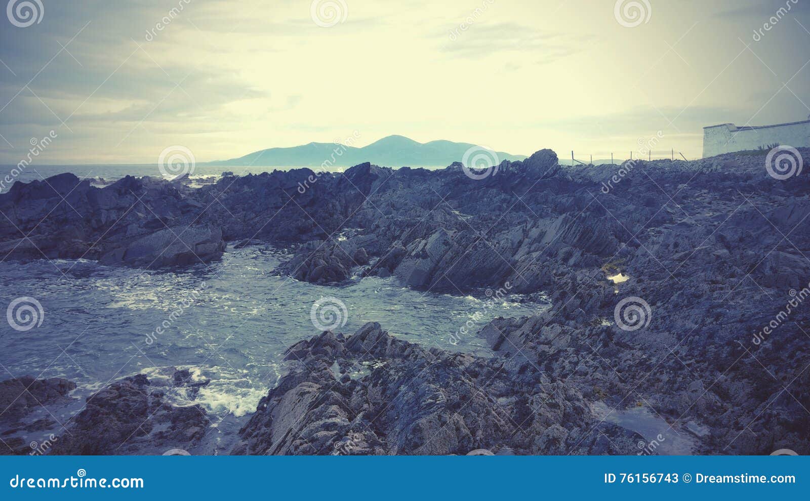 Rock stock image. Image of sharp, calm, water, rock, bellow - 76156743