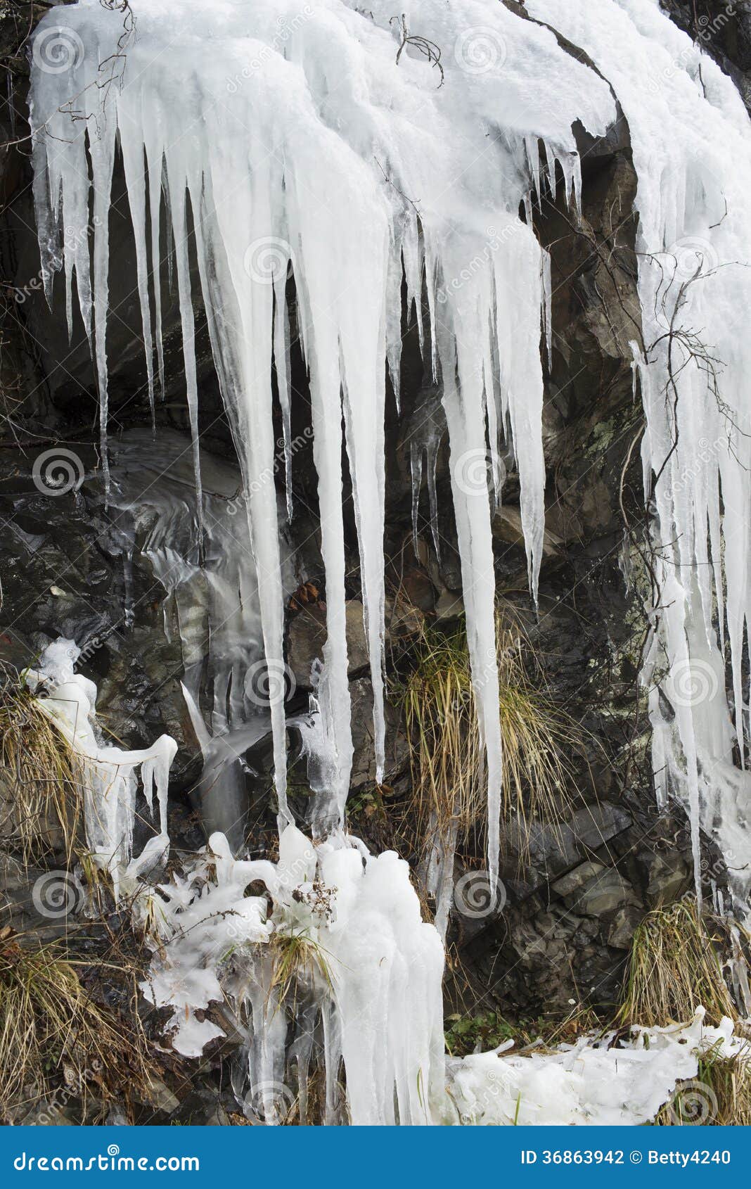 A Rock Cliff with Frozen Icles. Stock Photo - Image of crystal, nature ...