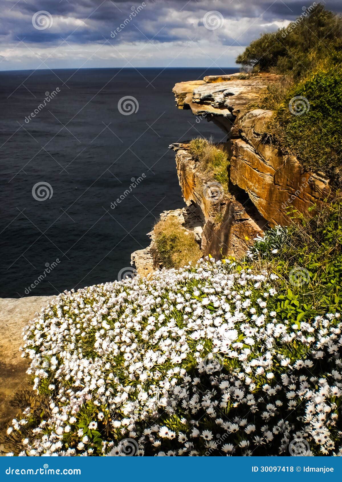 Rock cliff beside the sea stock photo. Image of beach - 30097418