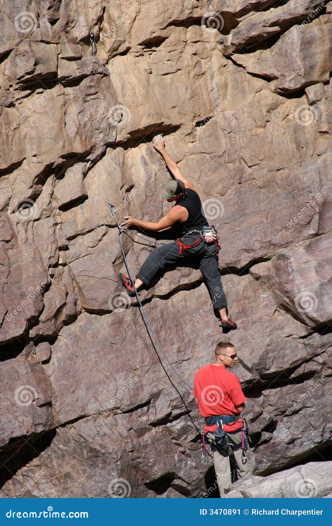 Rock climber with belayer stock image. Image of braced - 3470891