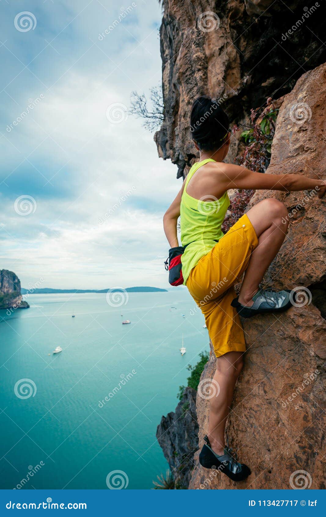 Rock Climber Climbing on Seaside Steep Cliff Stock Image - Image of ...