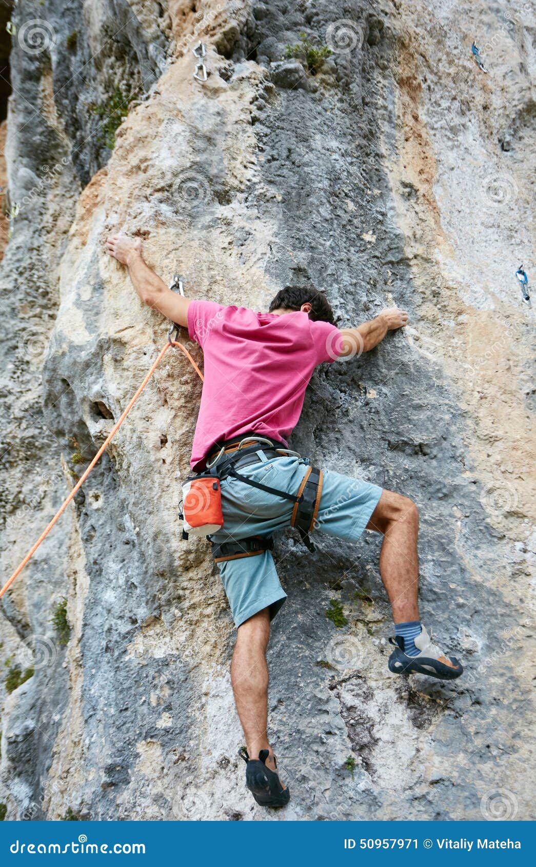 Rock Climber Climbing Up a Cliff Stock Image - Image of cliff, holding ...