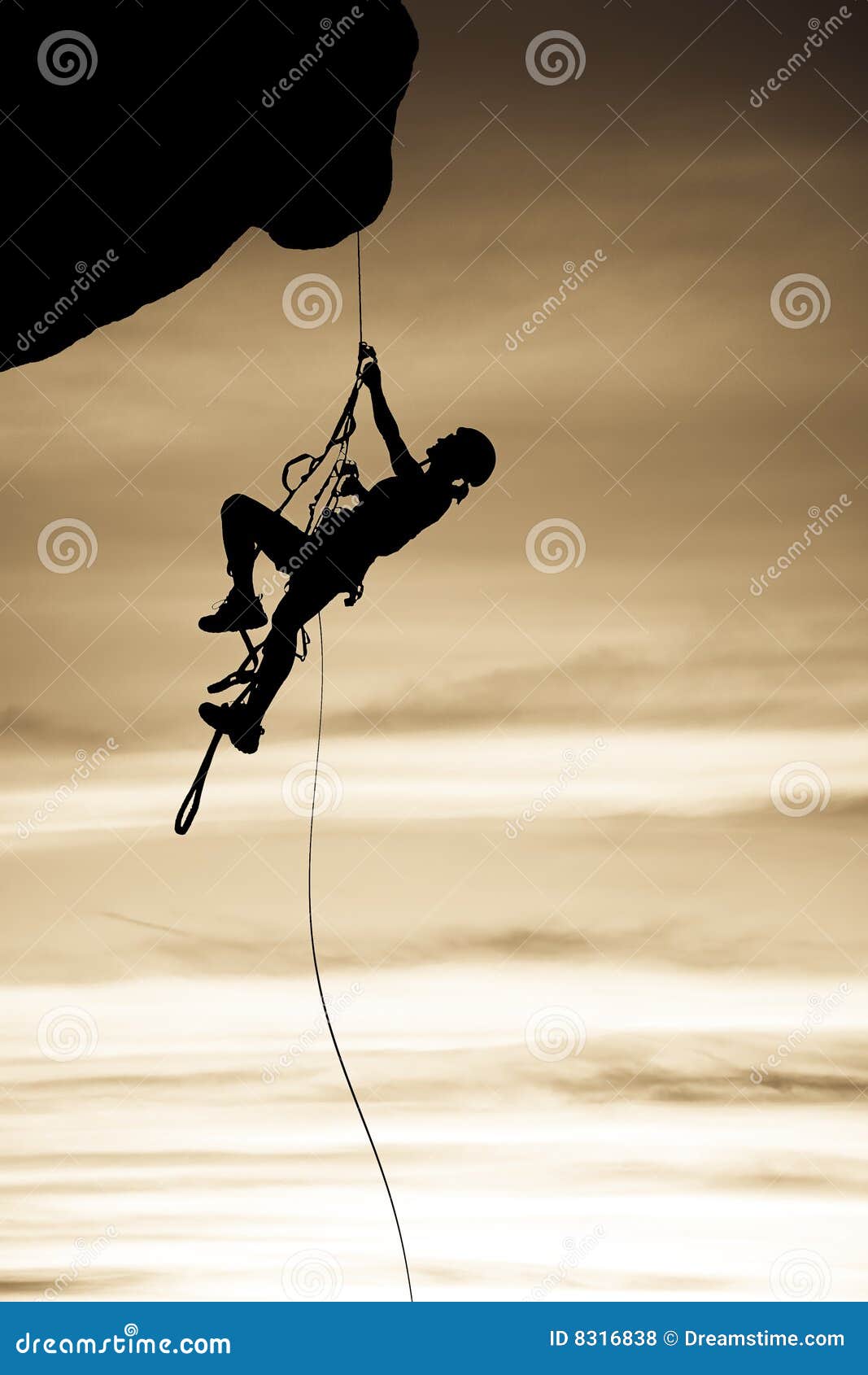 Rock Climber Dangling from a Rope. Stock Photo - Image of airborne ...