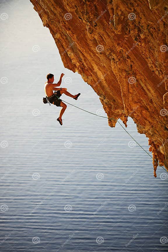 Rock Climber Falling of Cliff while Lead Climbing Stock Photo - Image ...