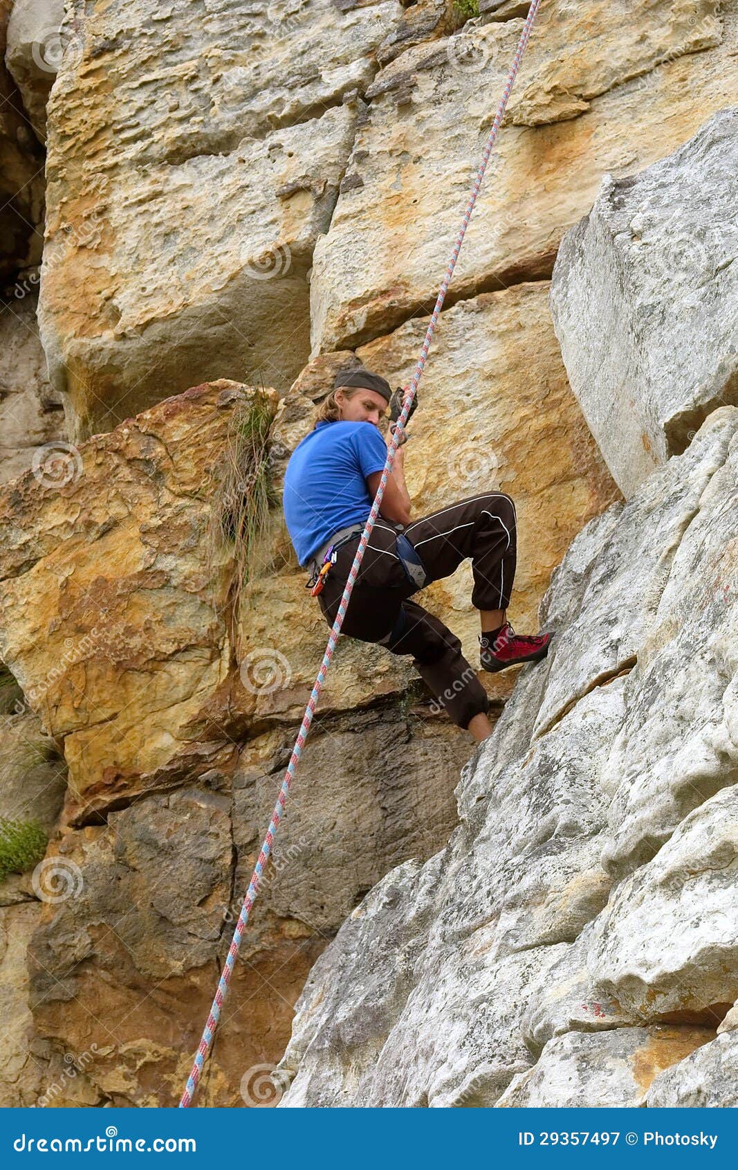 Rock climber looks down stock image. Image of beautiful - 29357497