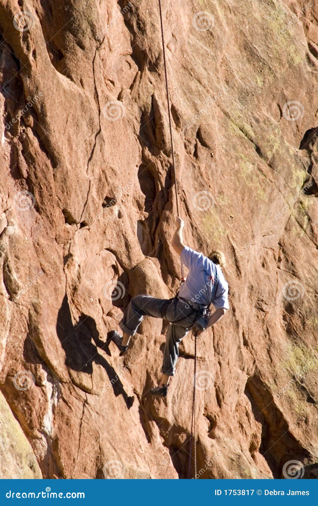 Rock Climber Rapelling Down Face of Rock Formation Stock Image - Image ...