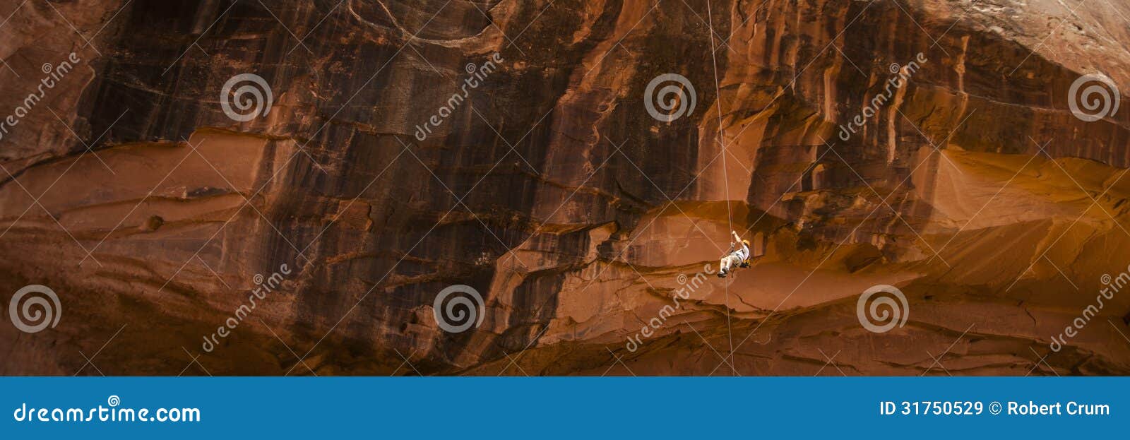 Rock Climber Rapelling Down Orange Cliff Stock Image - Image of rocky ...