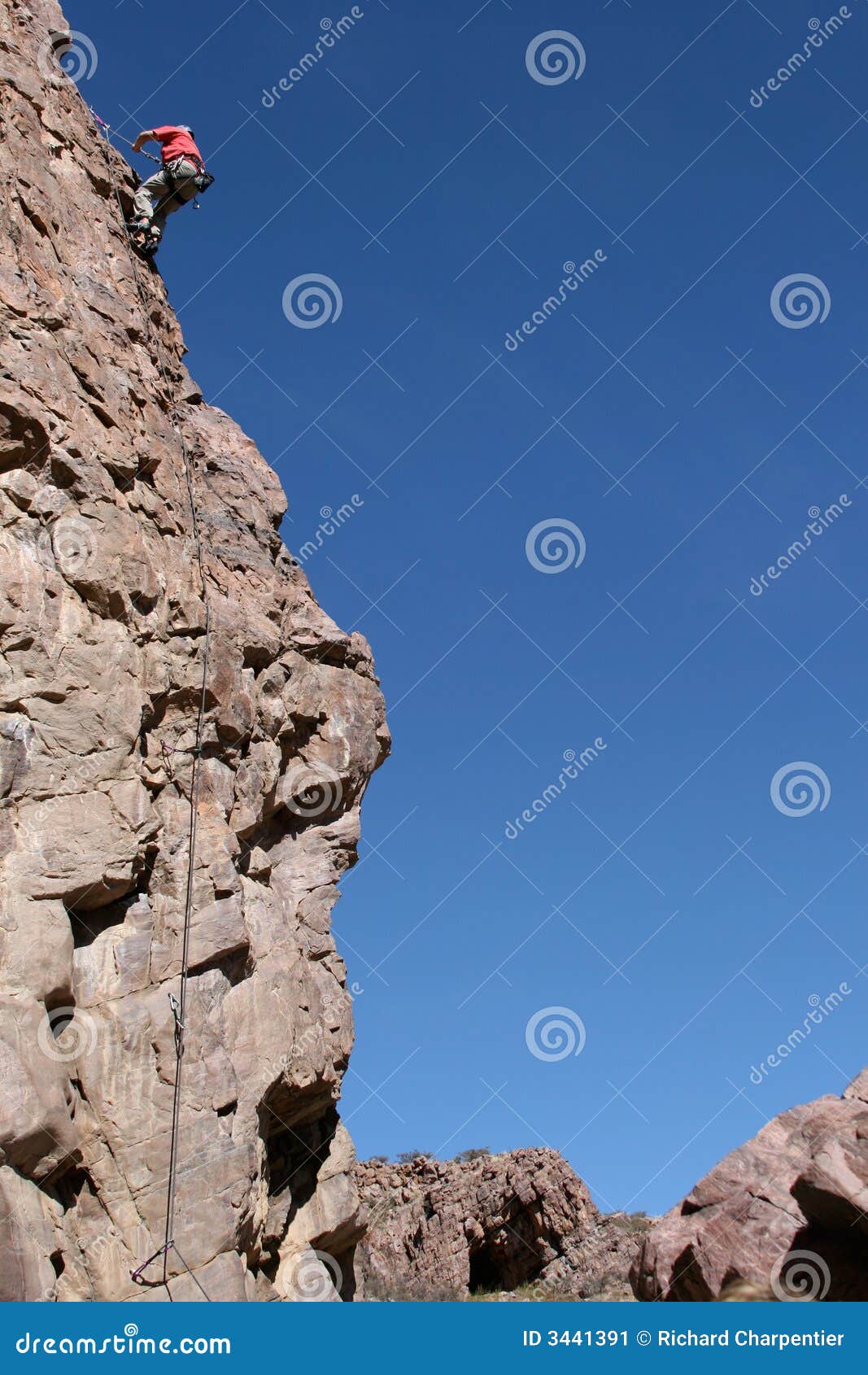 Rock climber rappeling stock image. Image of challenge - 3441391