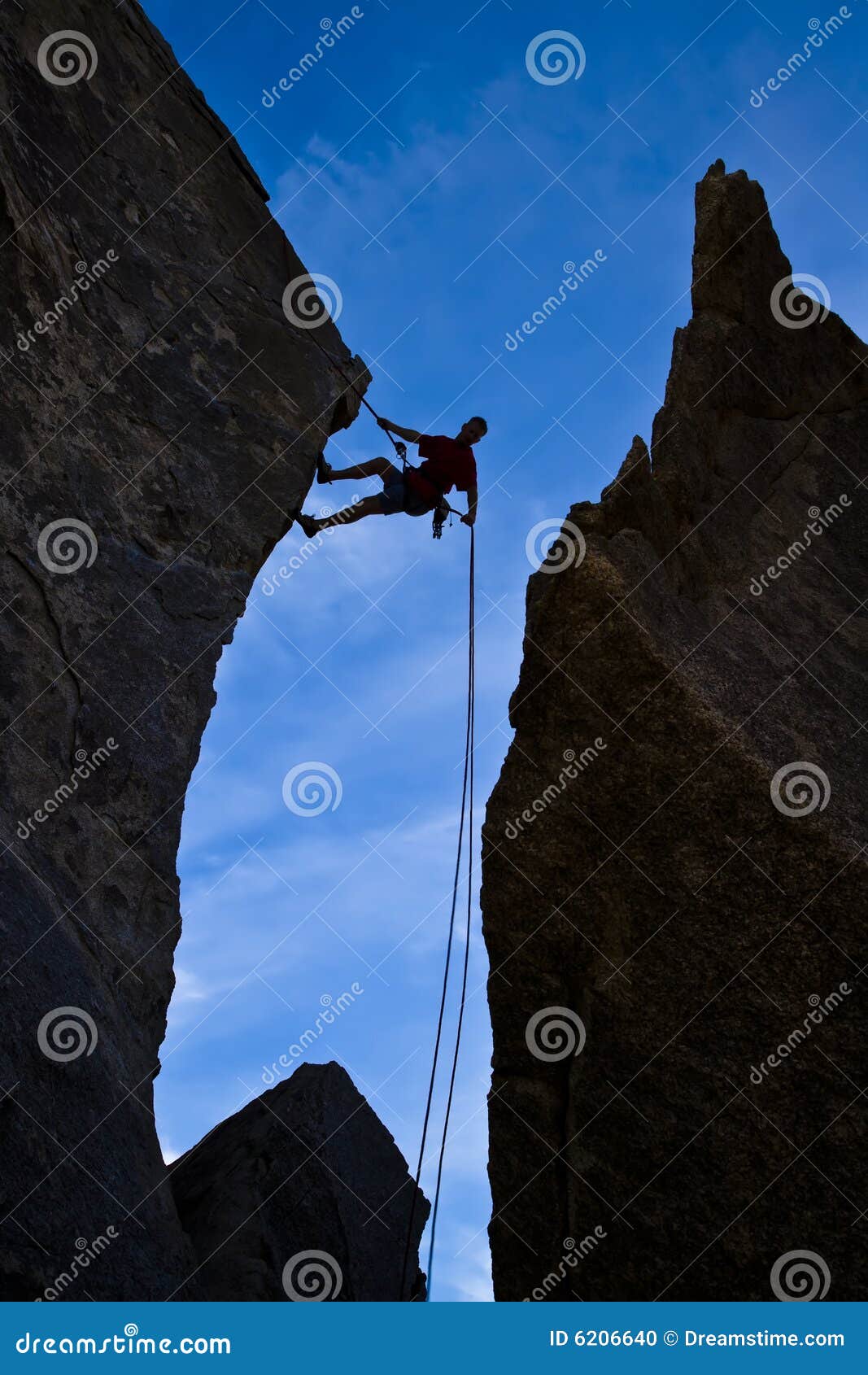 Rock climber rappelling. stock photo. Image of healthy - 6206640