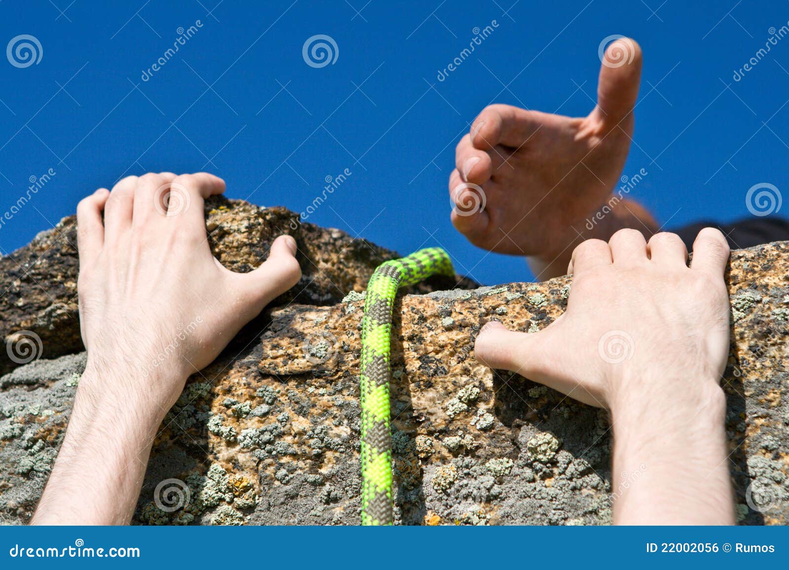 Rock Climber Reaching for Helping-hand Partner. Stock Photo - Image of ...