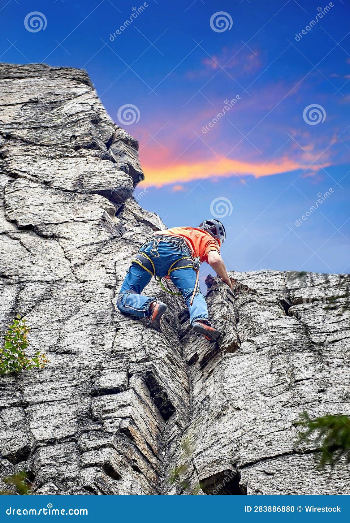 Rock Climber Reaching the Top. Stock Photo - Image of sunset, challenge ...