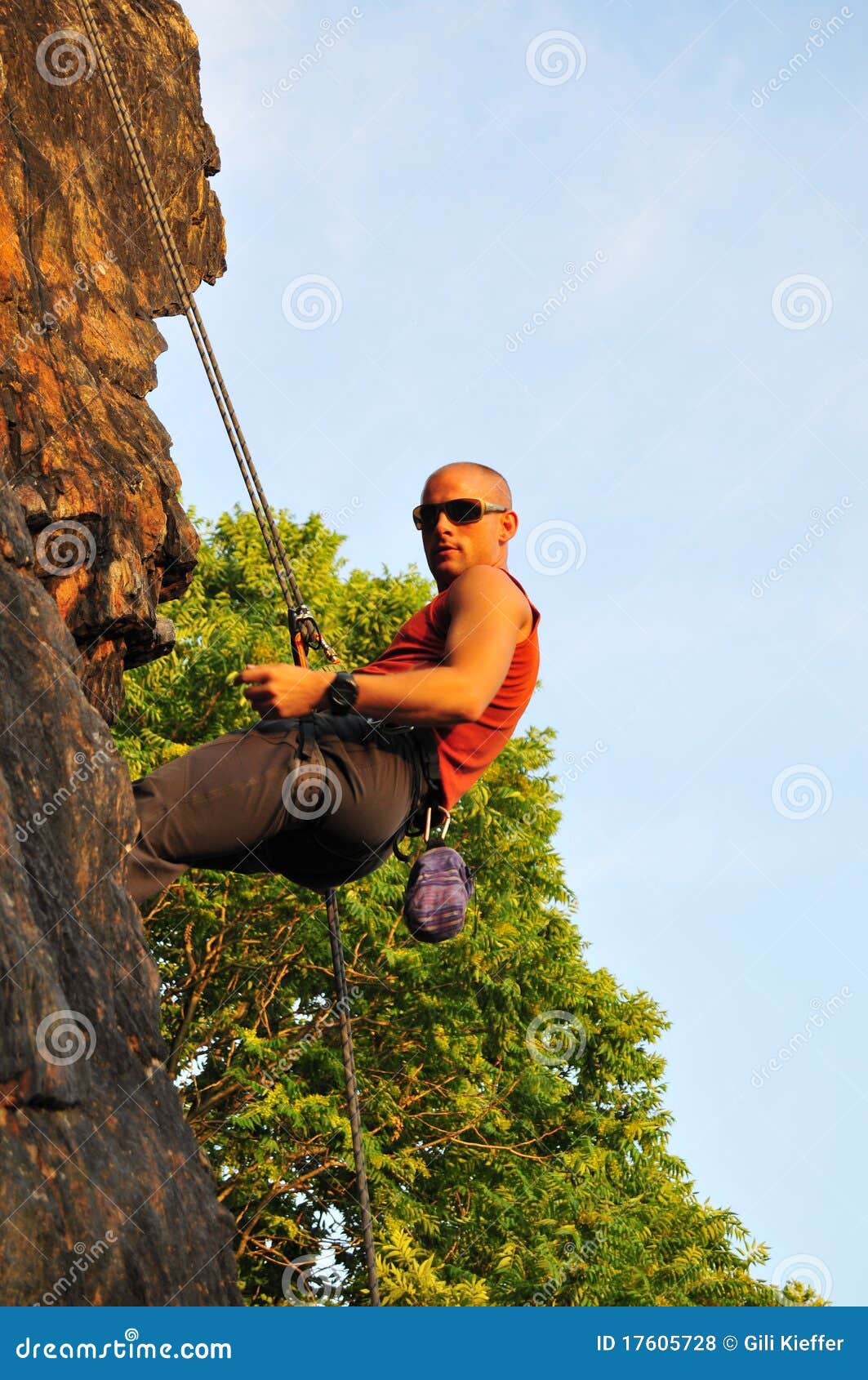 Rock climber repelling stock photo. Image of male, sport - 17605728