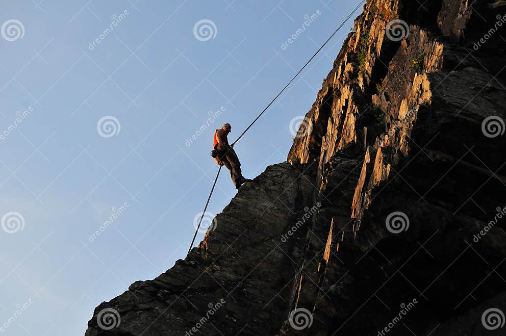 Rock climber repelling stock photo. Image of climber - 17605730